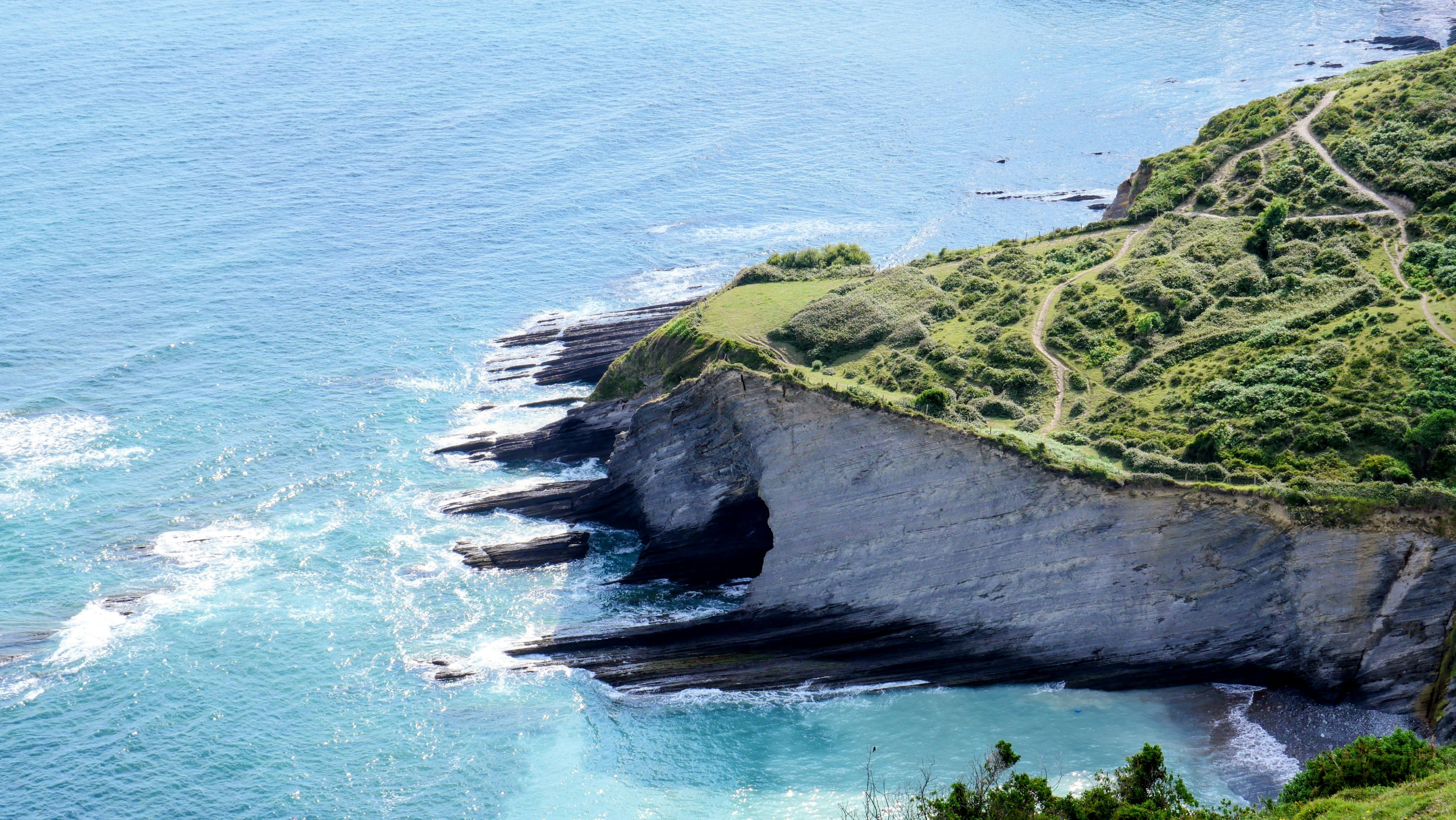 Cliff Path Along a Turquoise Strait