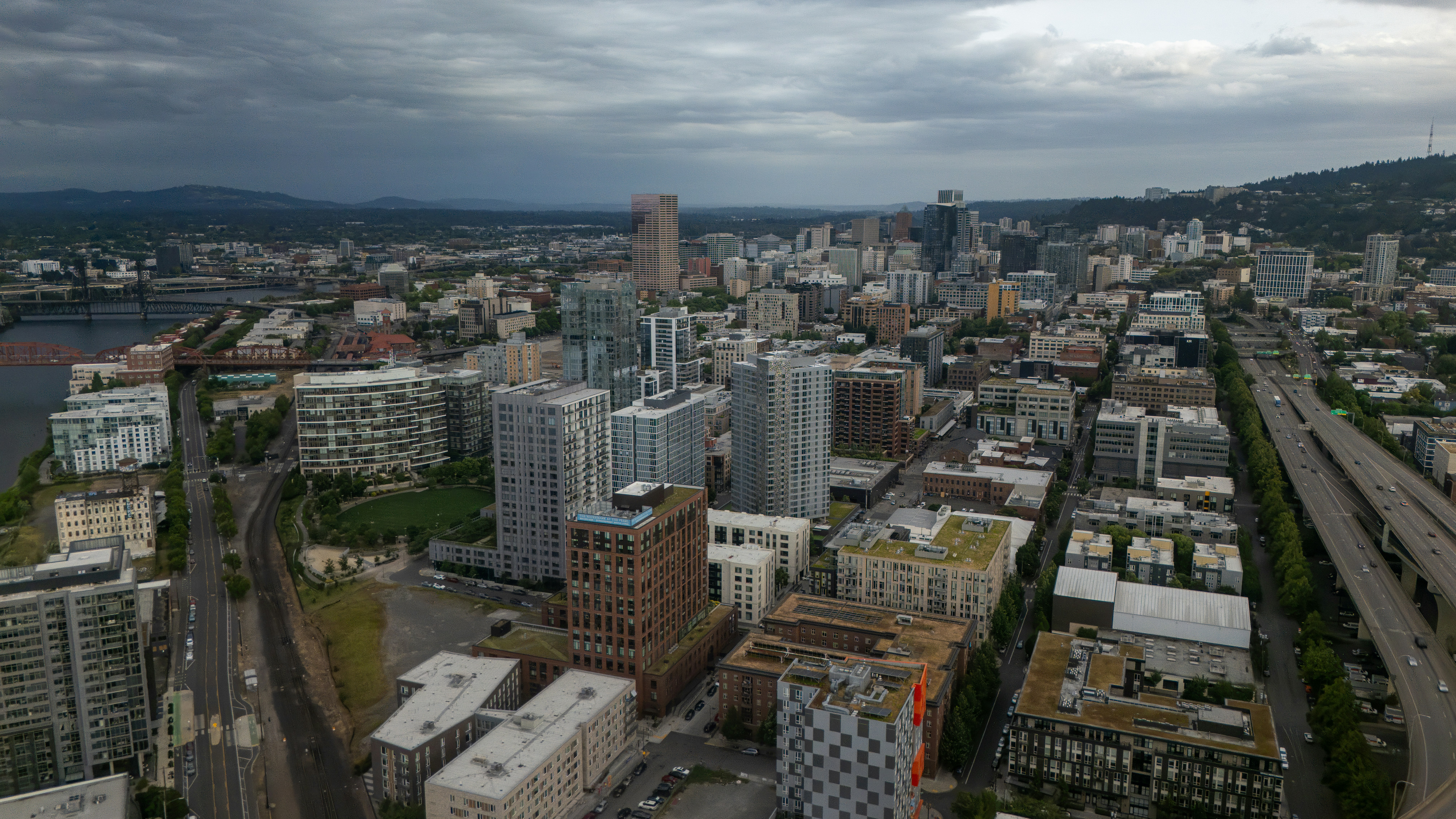 City Mosaic: Aerial Grid of Buildings and Railways