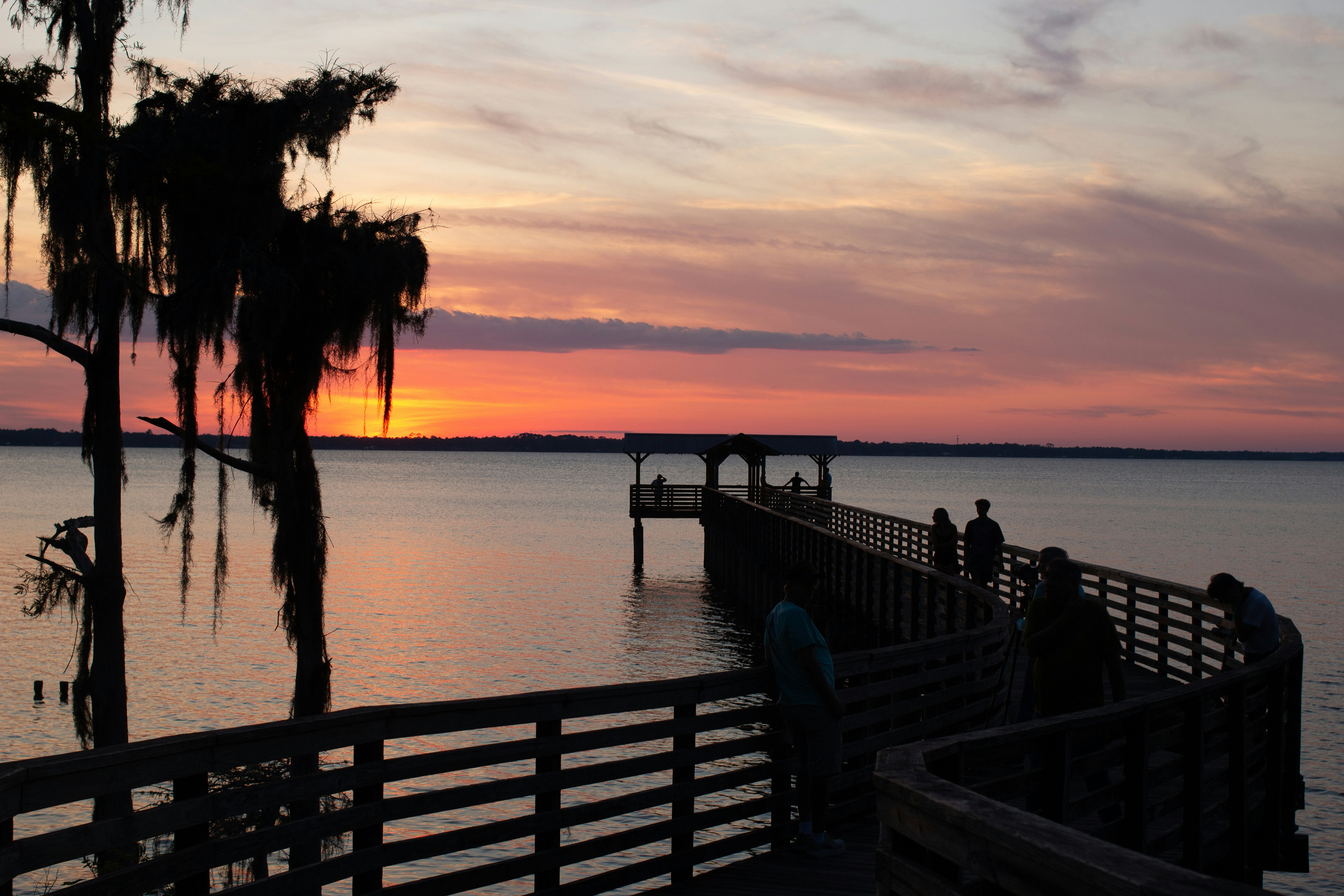 Sunset Pier: silhouettes at the edge of day