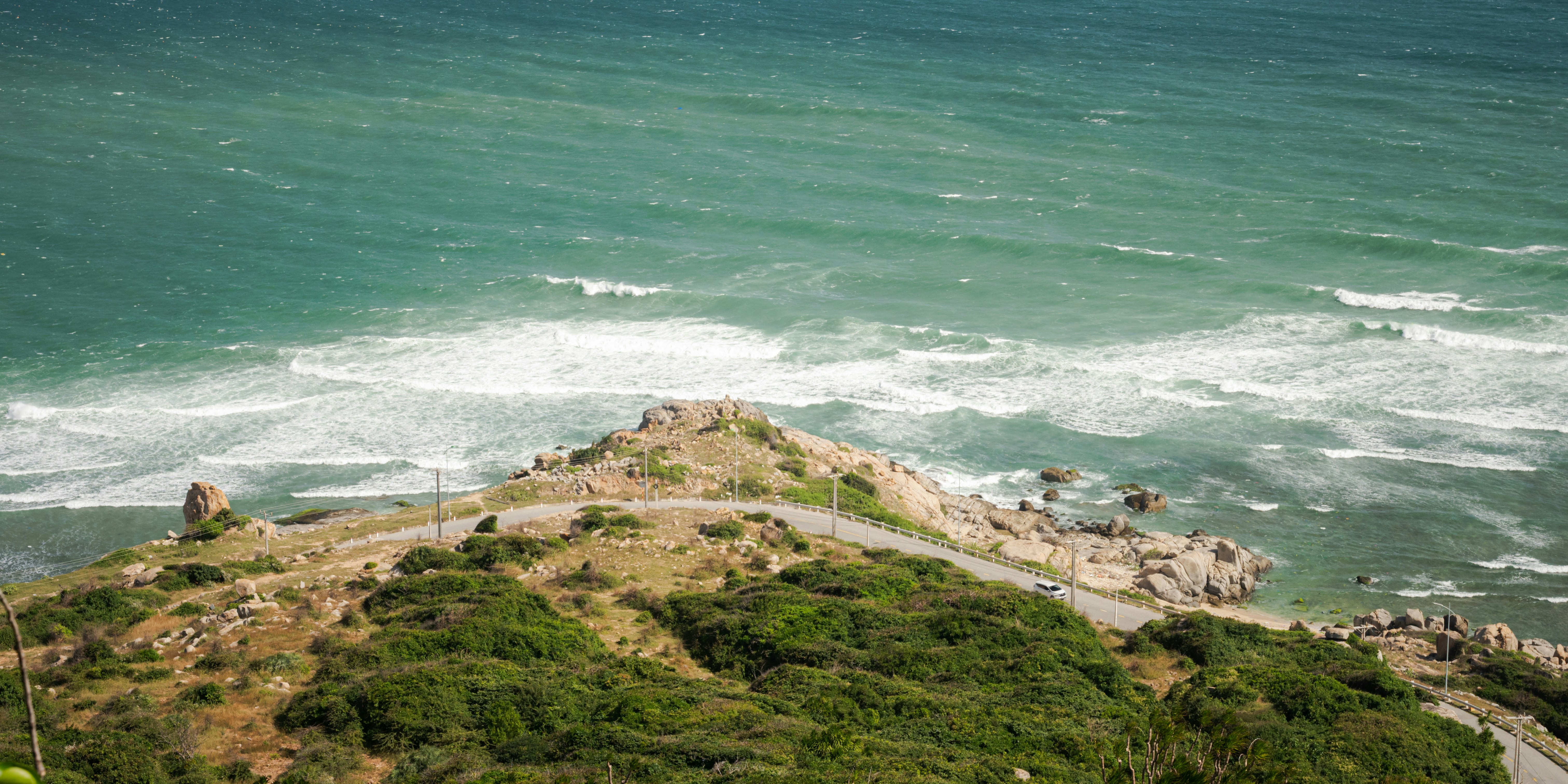Coastal Promontory Meeting the Roaring Sea