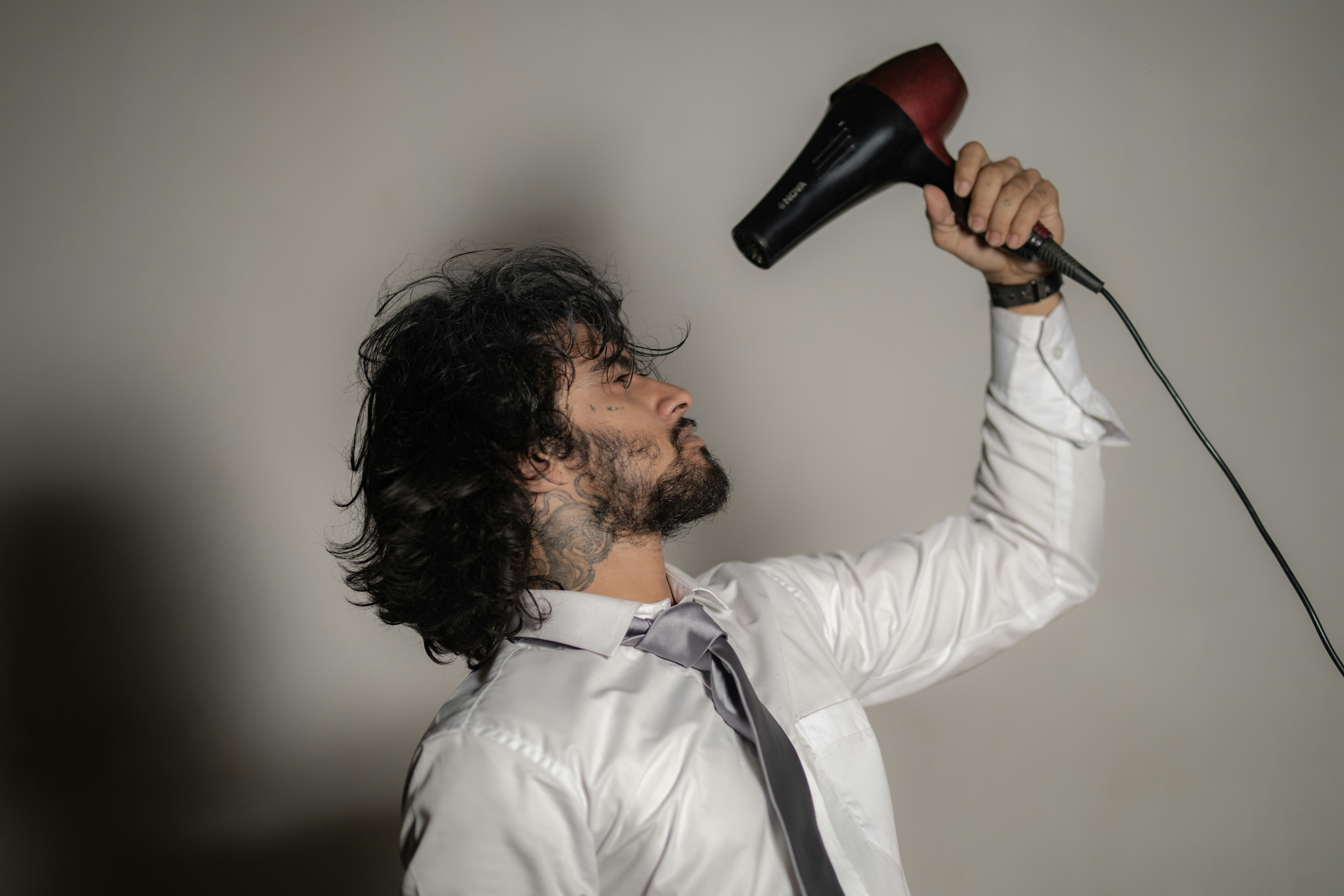Hairdryer Anthem: A Seated Salute to Style