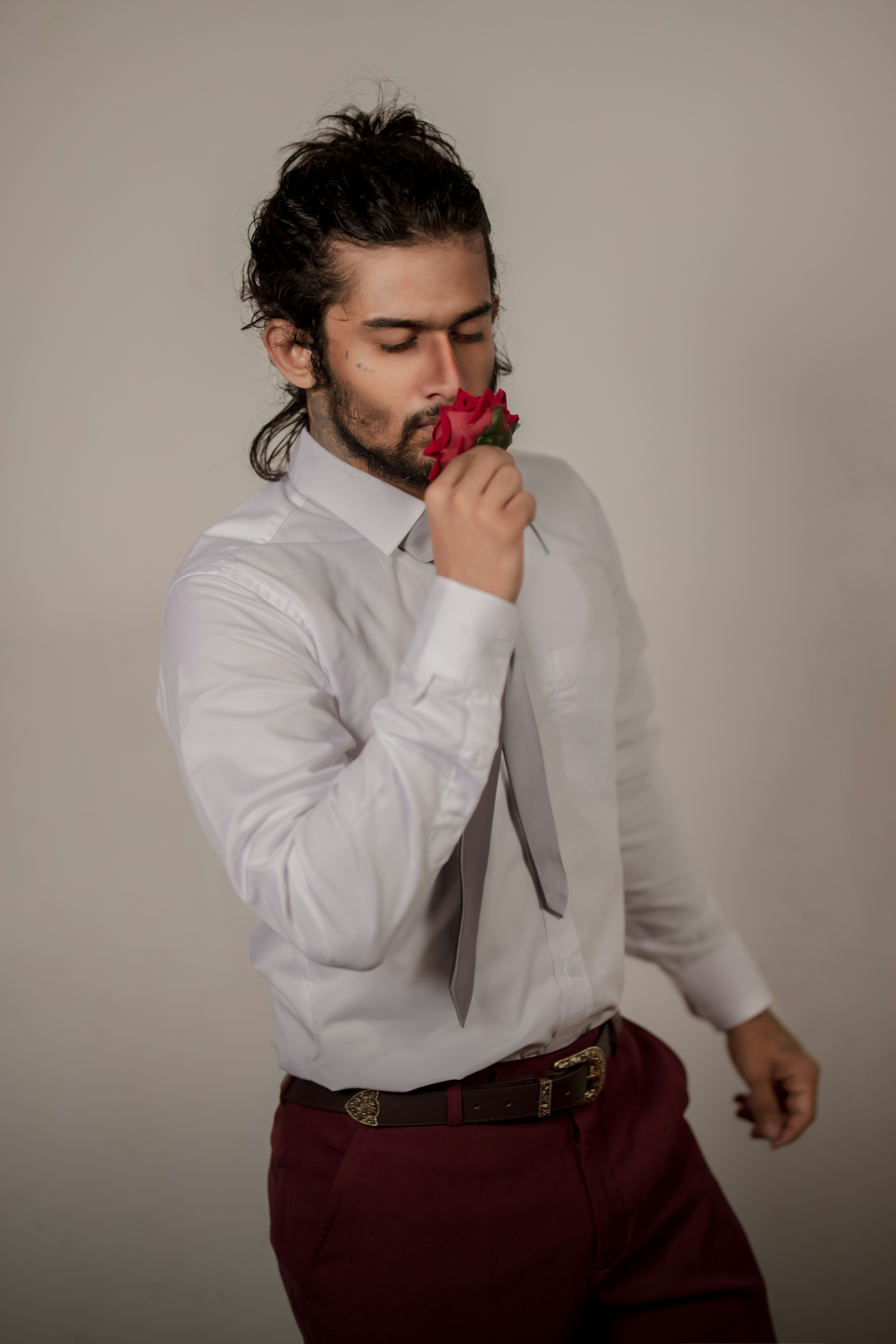 Gentleman in White: A Rose Between Focus and Form