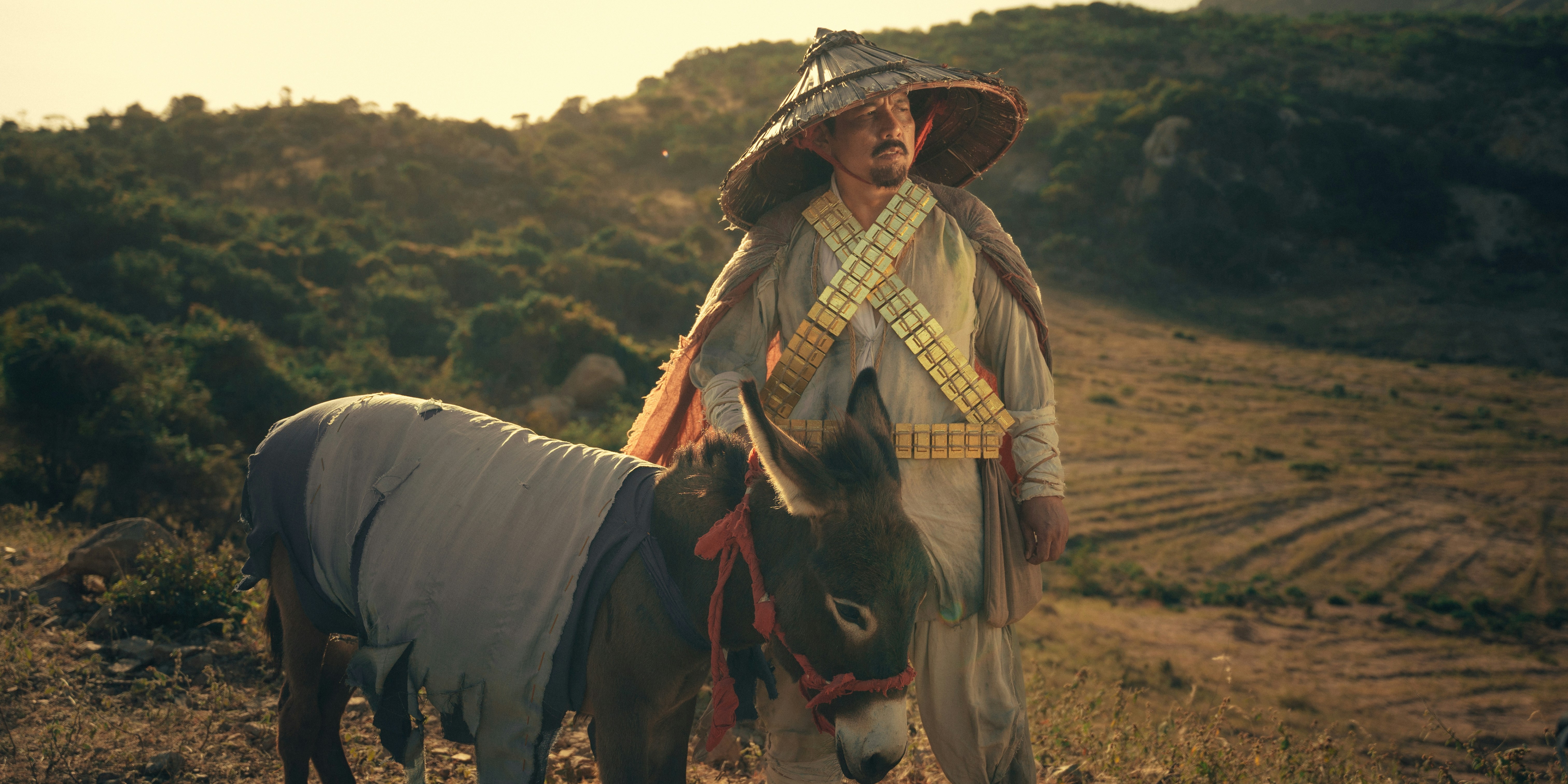 Dusty Ranger and His Donkey in Sunset Pasture