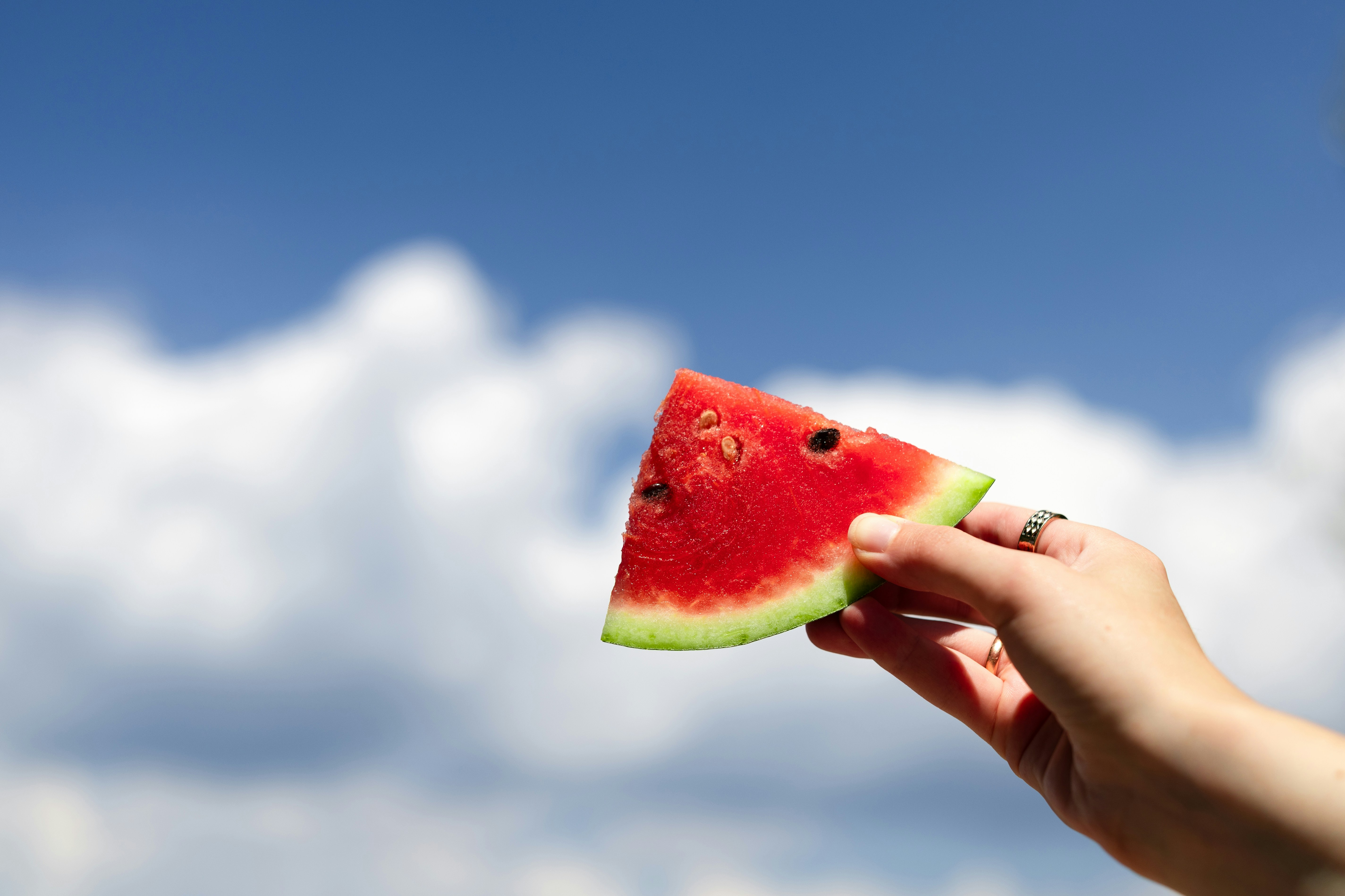 Sunlit Slice: A Handful of Summer Against a Velvet Sky