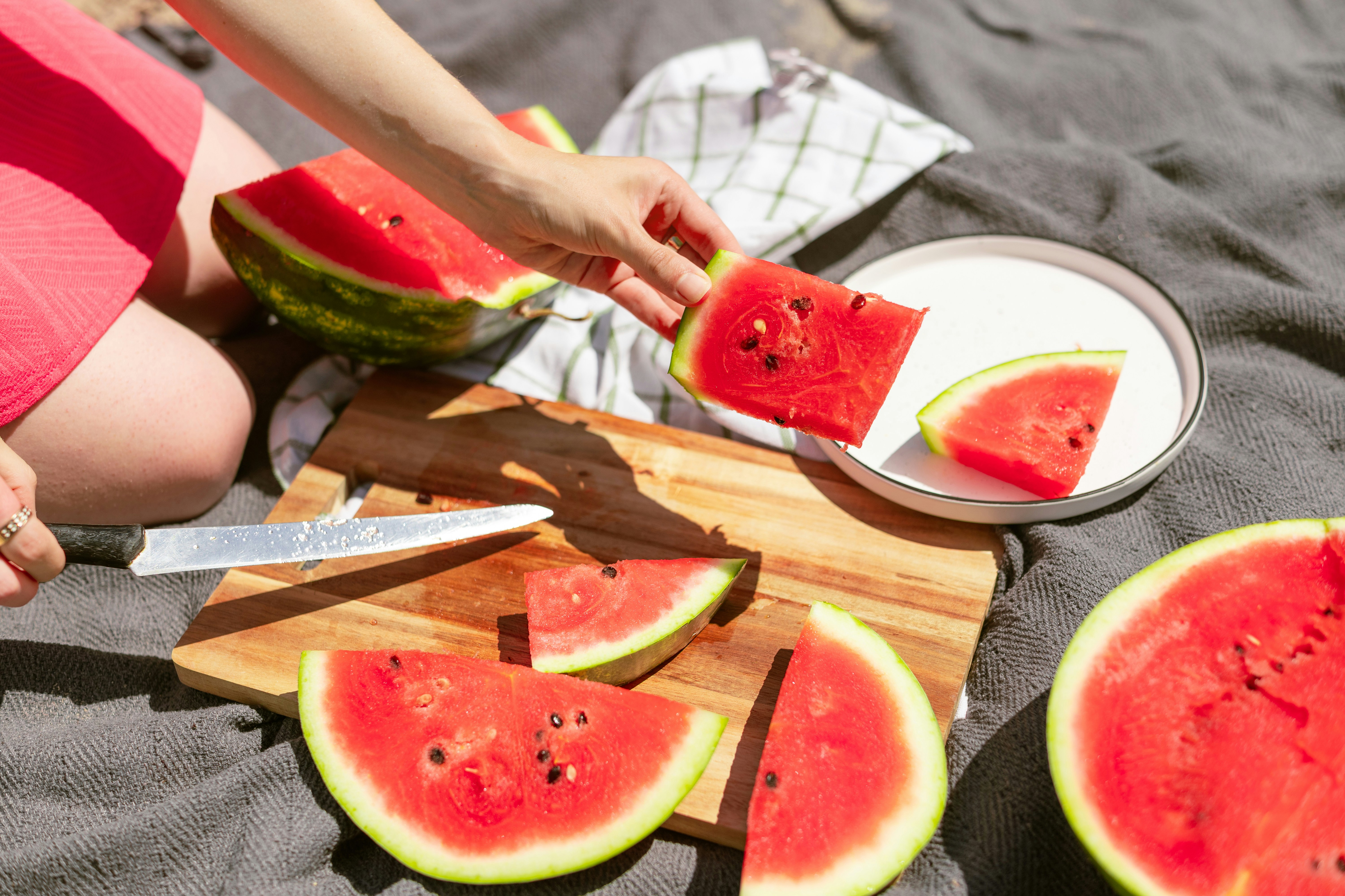 Summer Picnic Cut: A Slice of Watermelon on a Wooden Board
