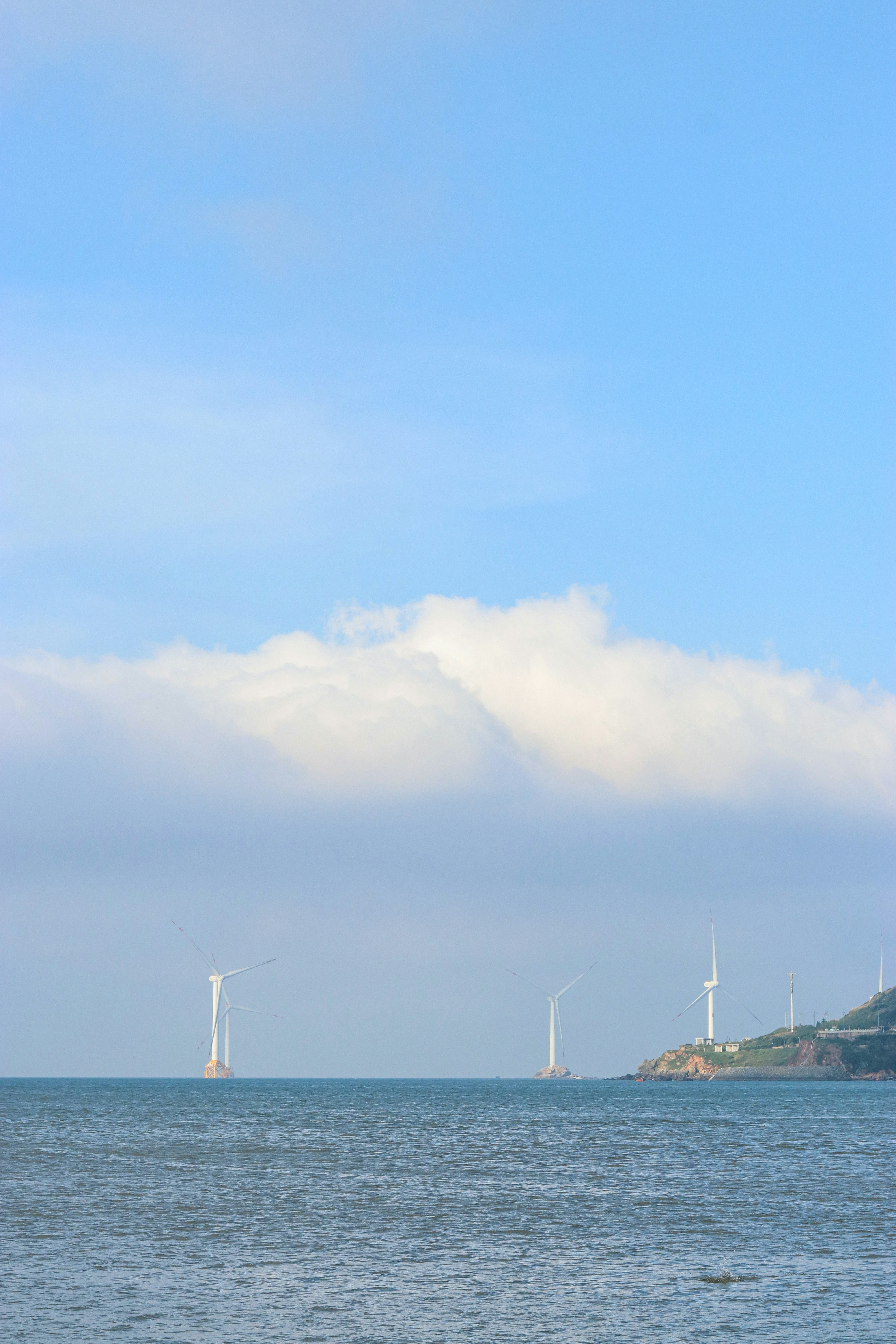 Coastal Turbines at Distant Horizon