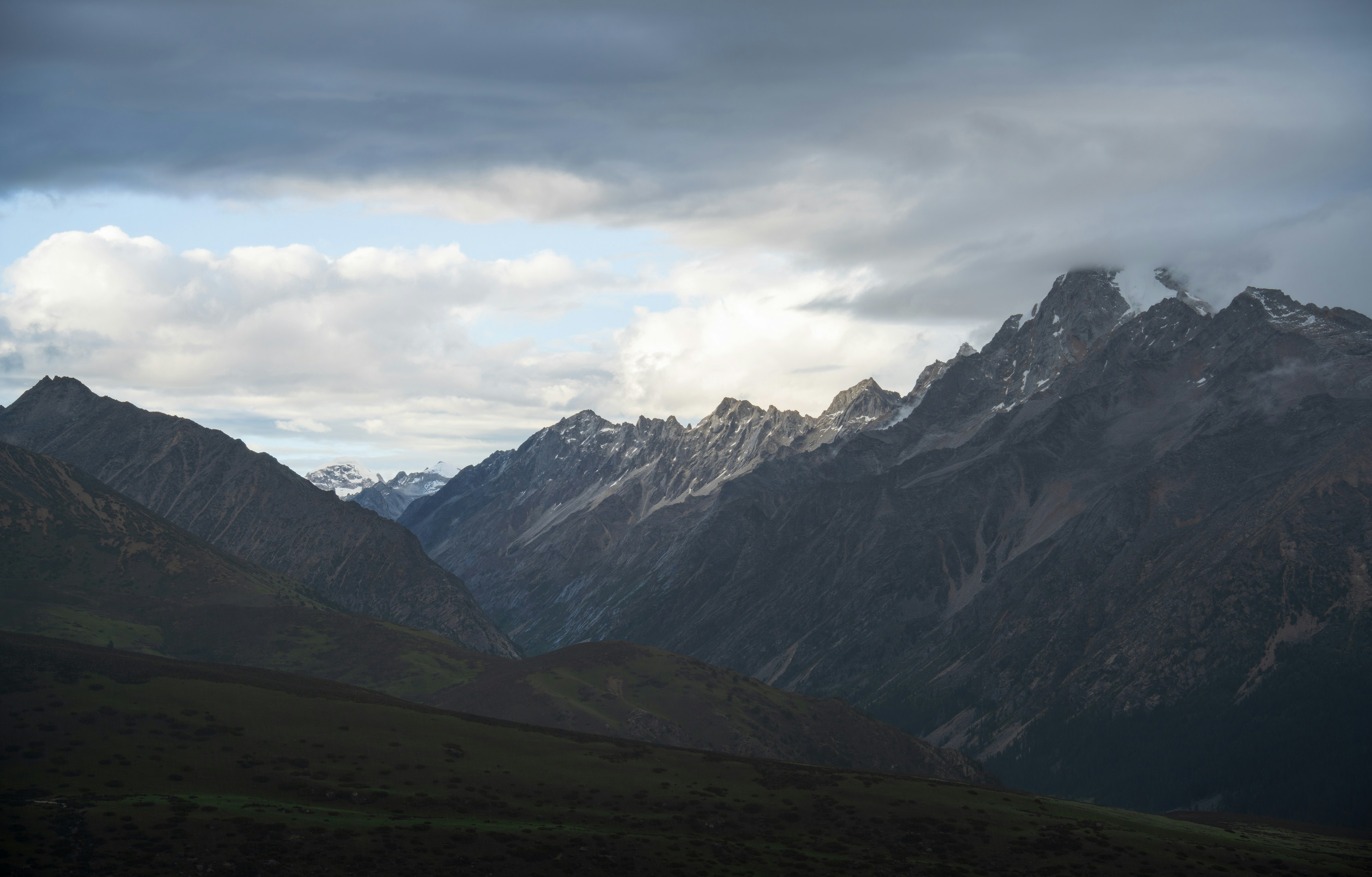 Majestic Ridge under a Stormy Break in the Alps