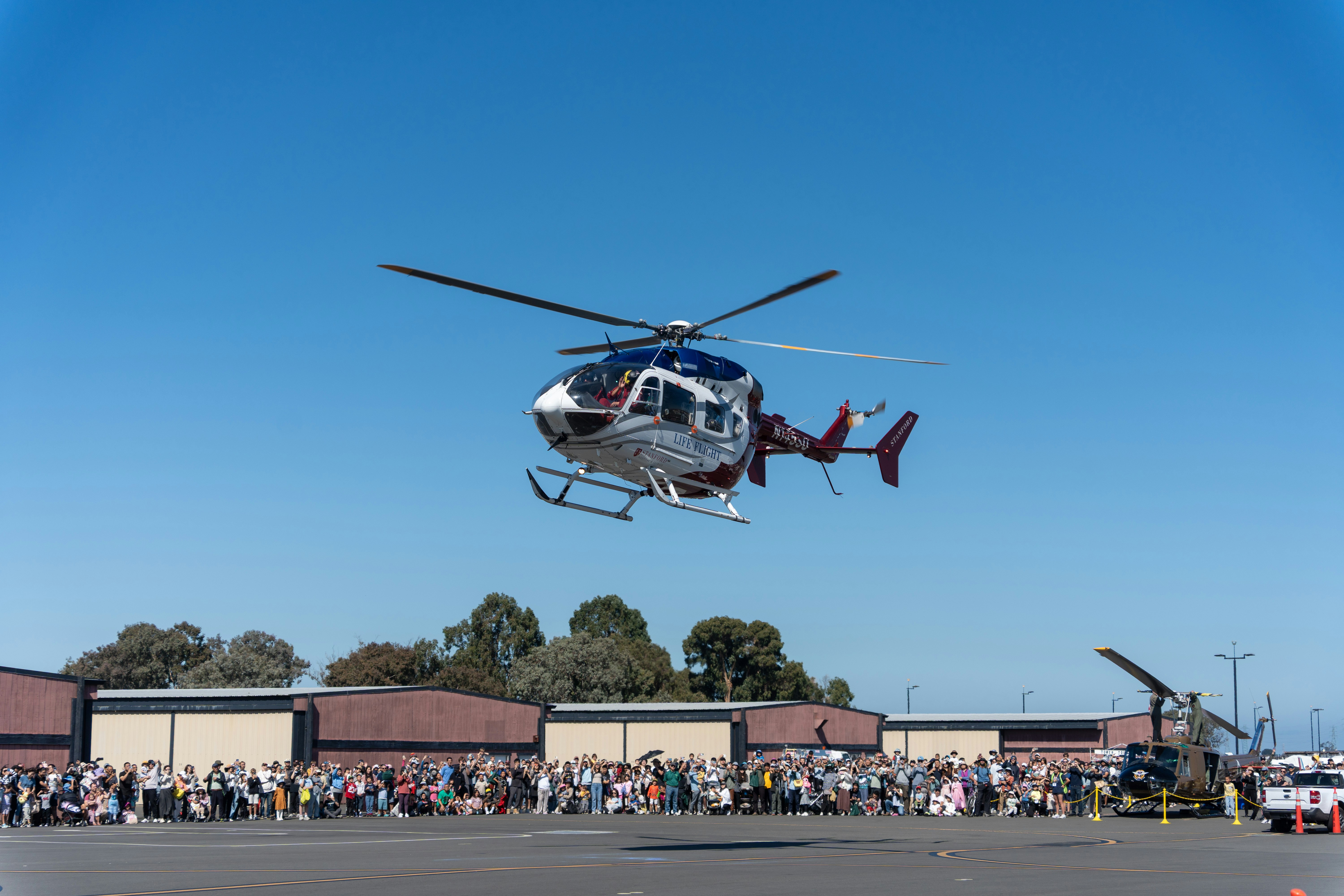 Audible Hover: A Rescue Helicopter Over a Ground Crowd