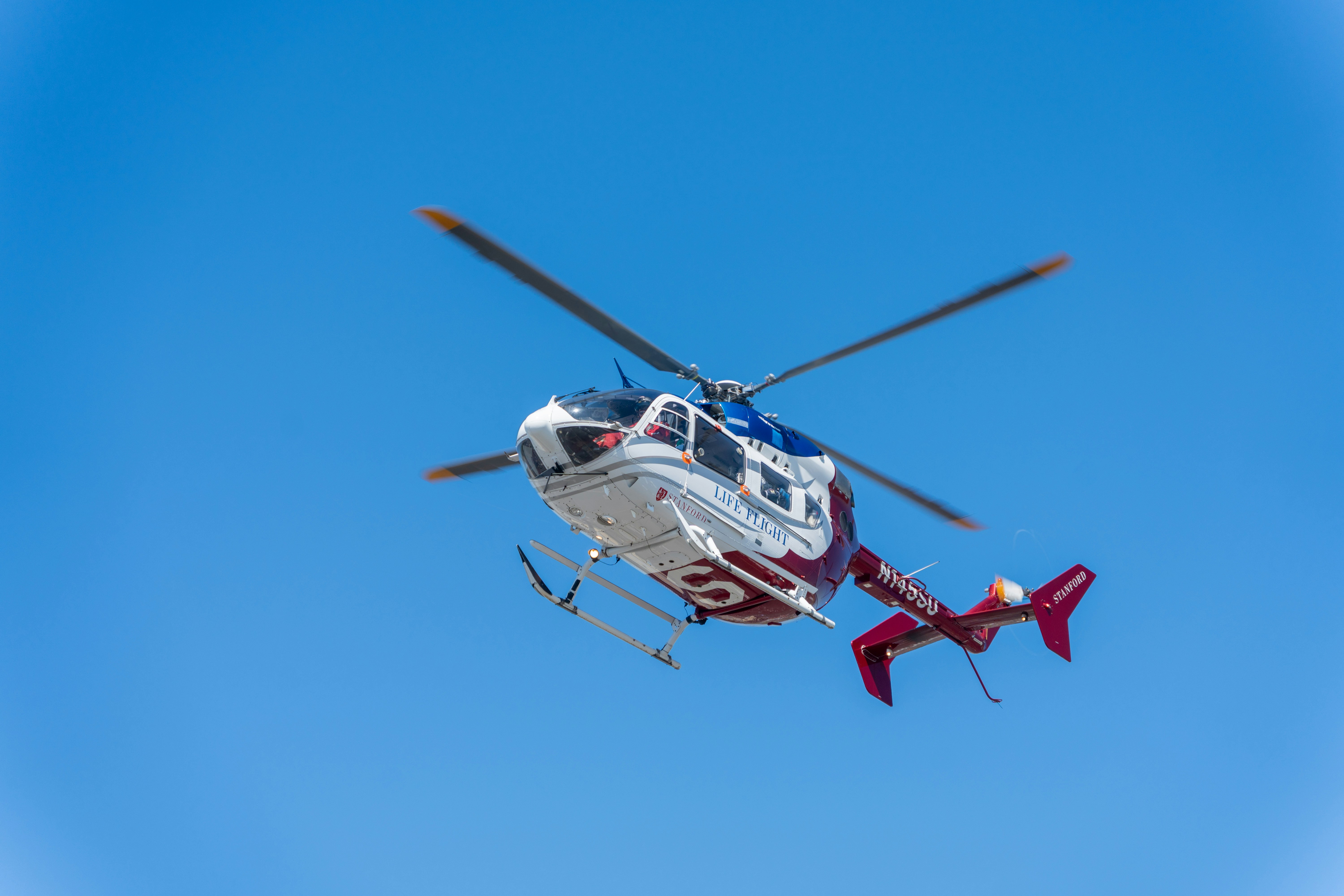 Blue-Backed Rescue Helicopter in Clear Sky