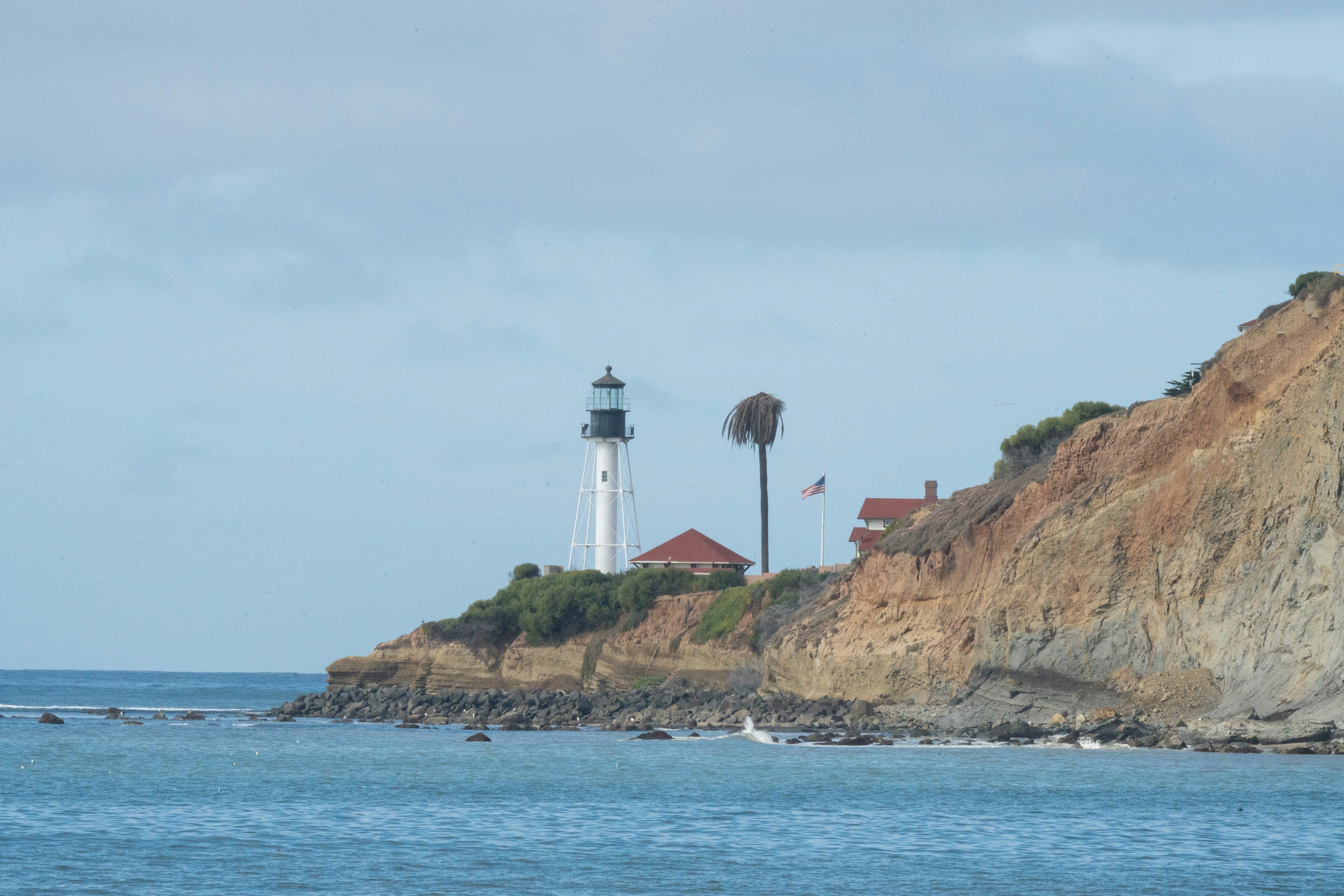 Lighthouse Sentinel Over the Coastal Cliff
