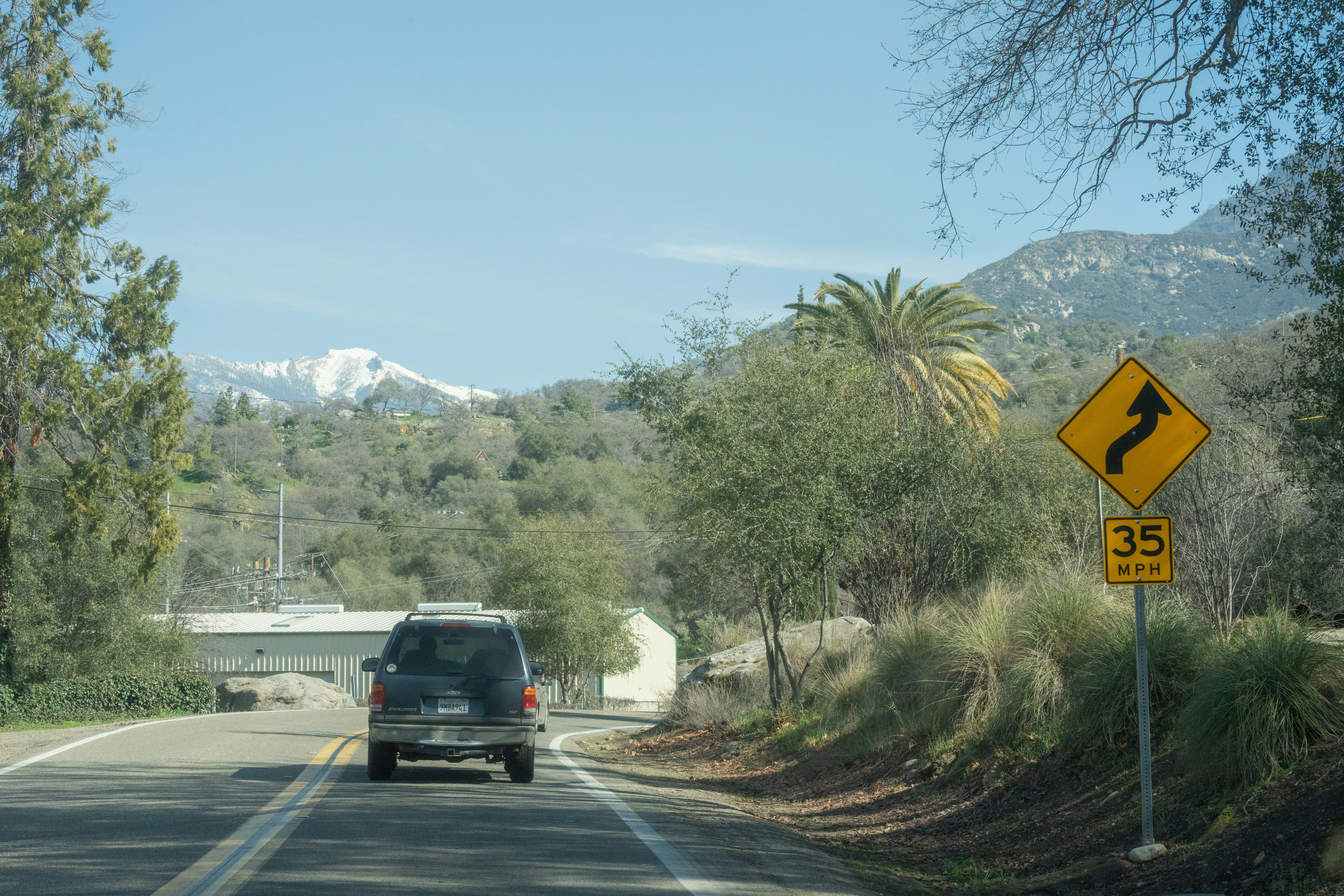 Curving Road to the Hillside, a Quiet Desert Drive