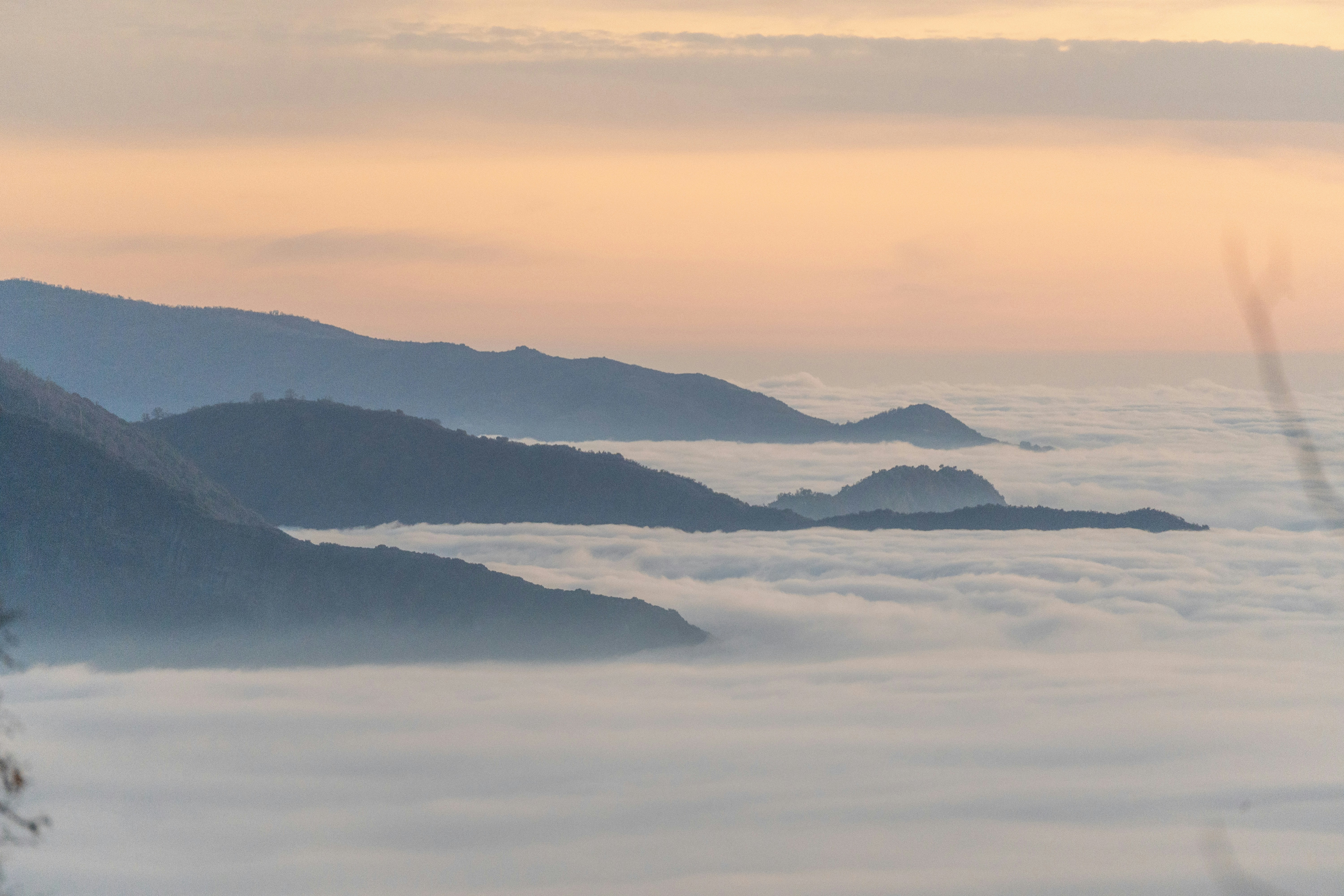 Mist-Layered Ridge at Sunrise