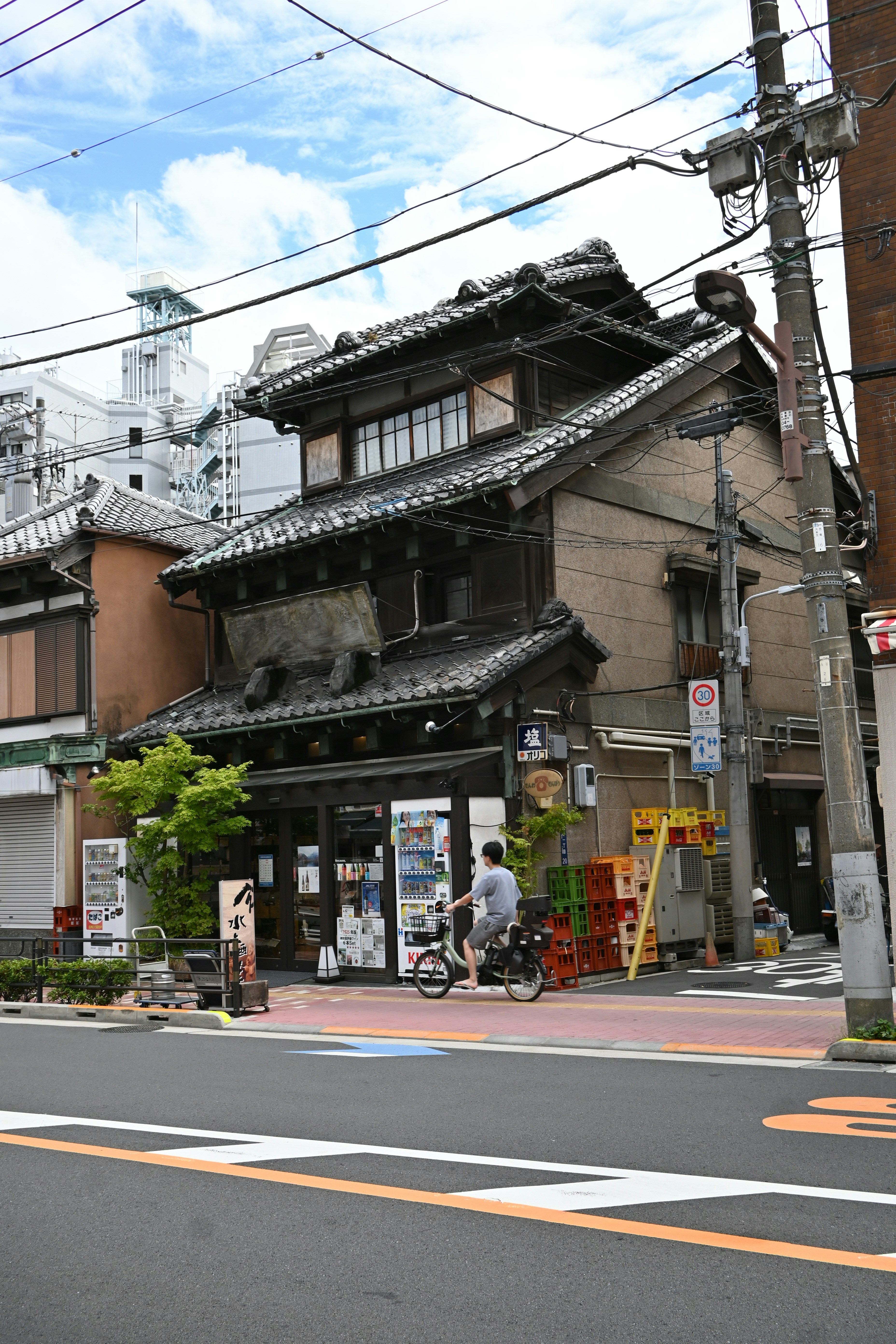 Traditional Ryokan Facade Meets City Street Morning Light