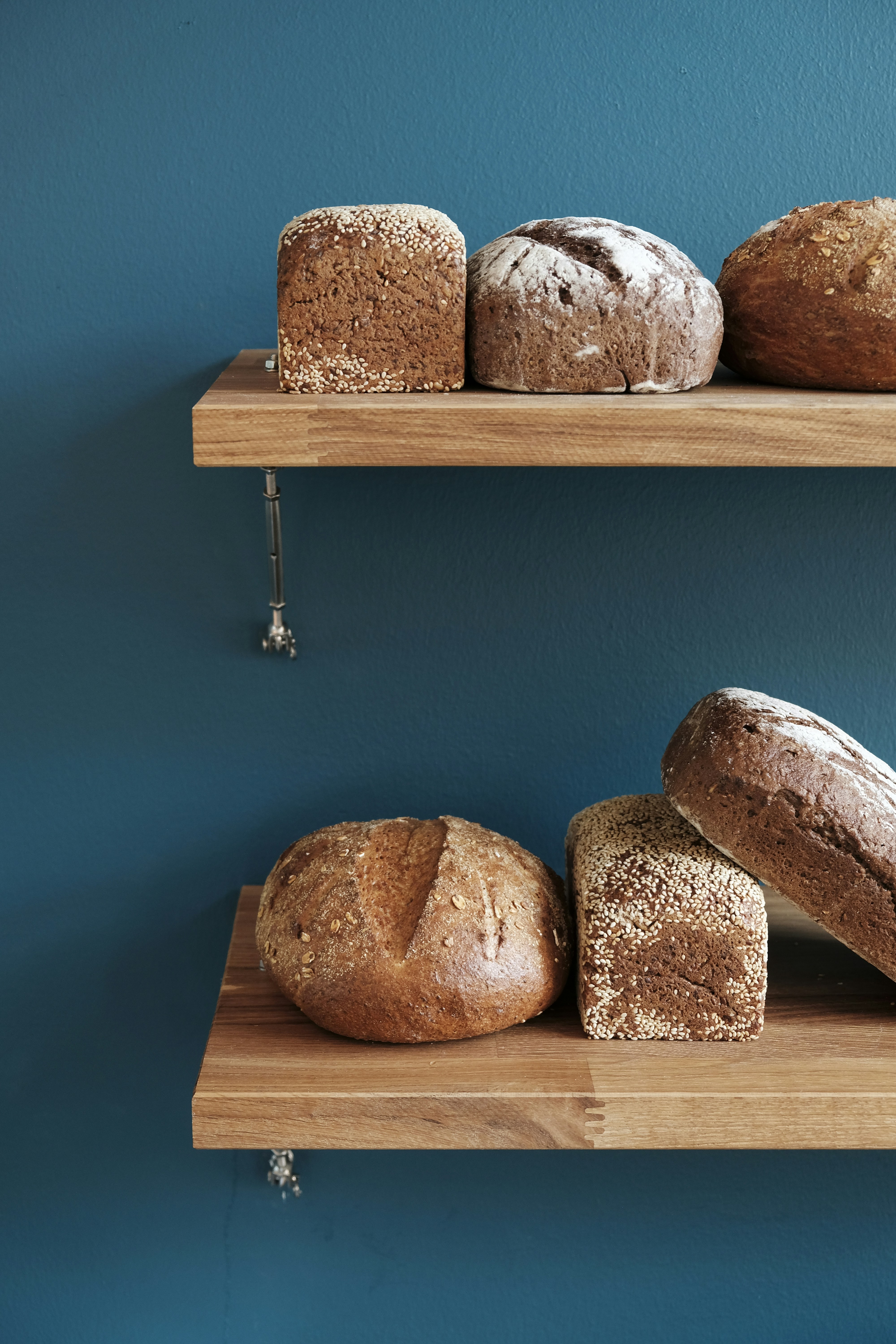 Bread on a Teal Shelf: A Quiet Bakery Still Life