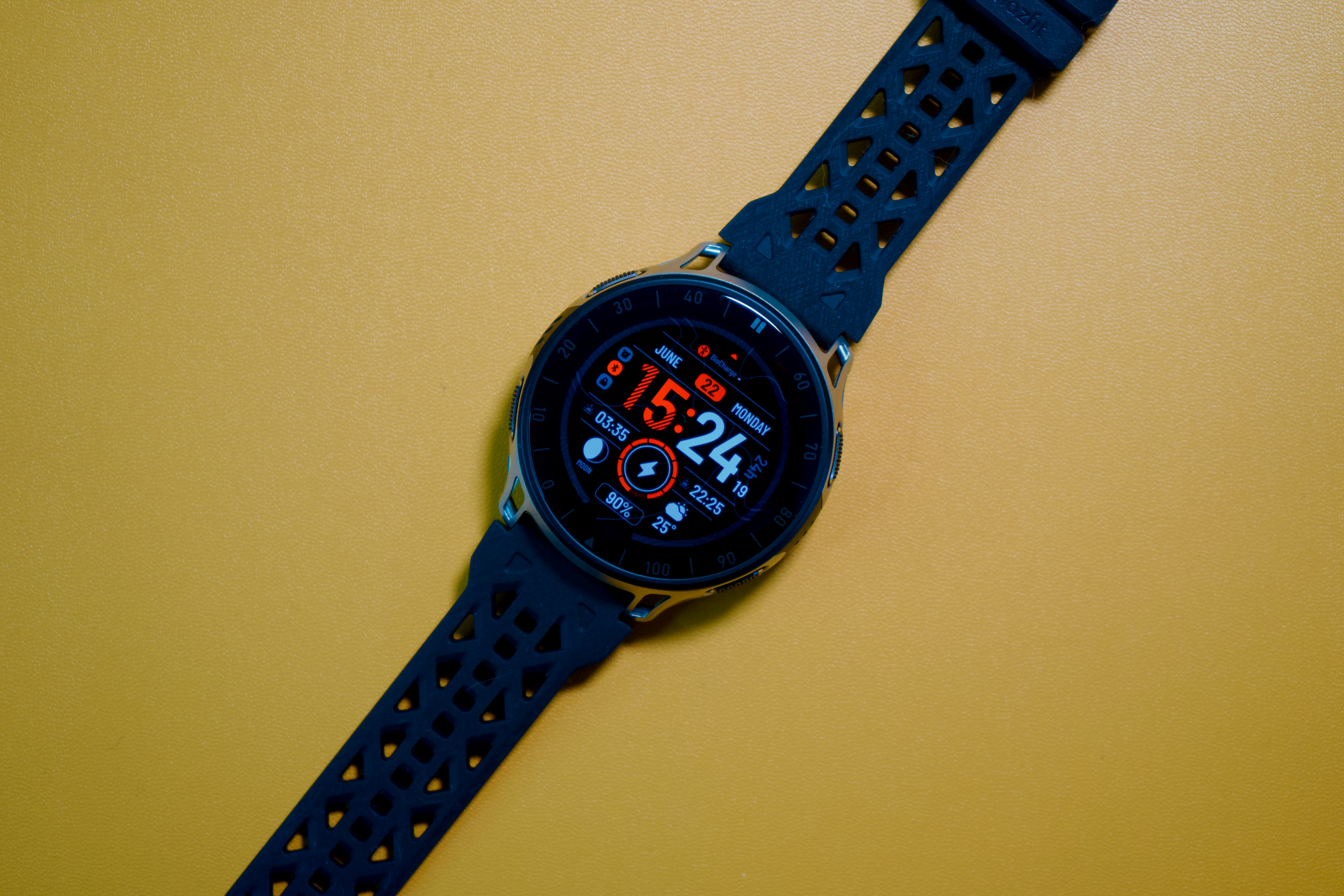 Luminous Timekeeper: A Modern Smartwatch Resting on a Golden Canvas