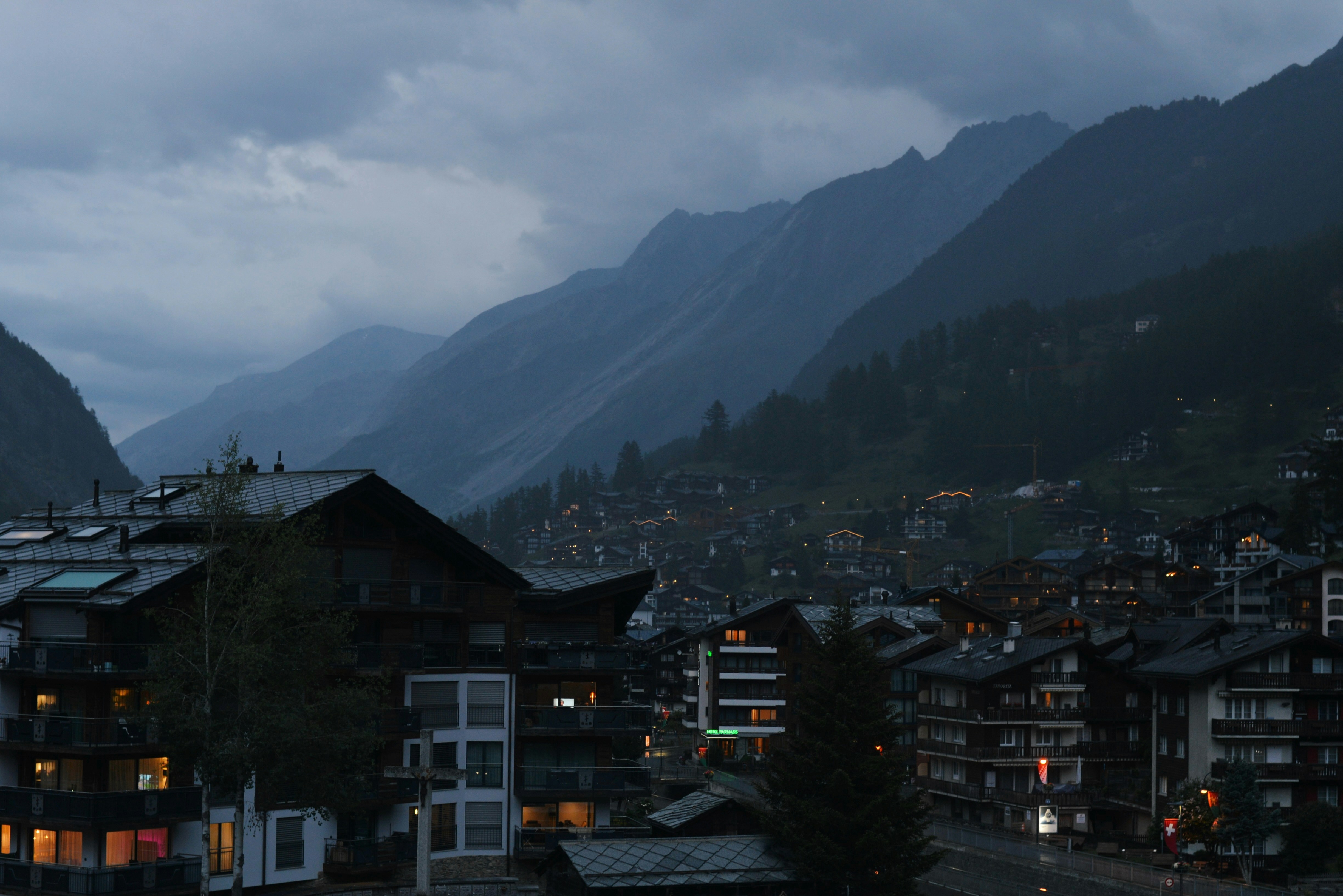 Dusk in the Alpine Village: Lights Between the Slopes