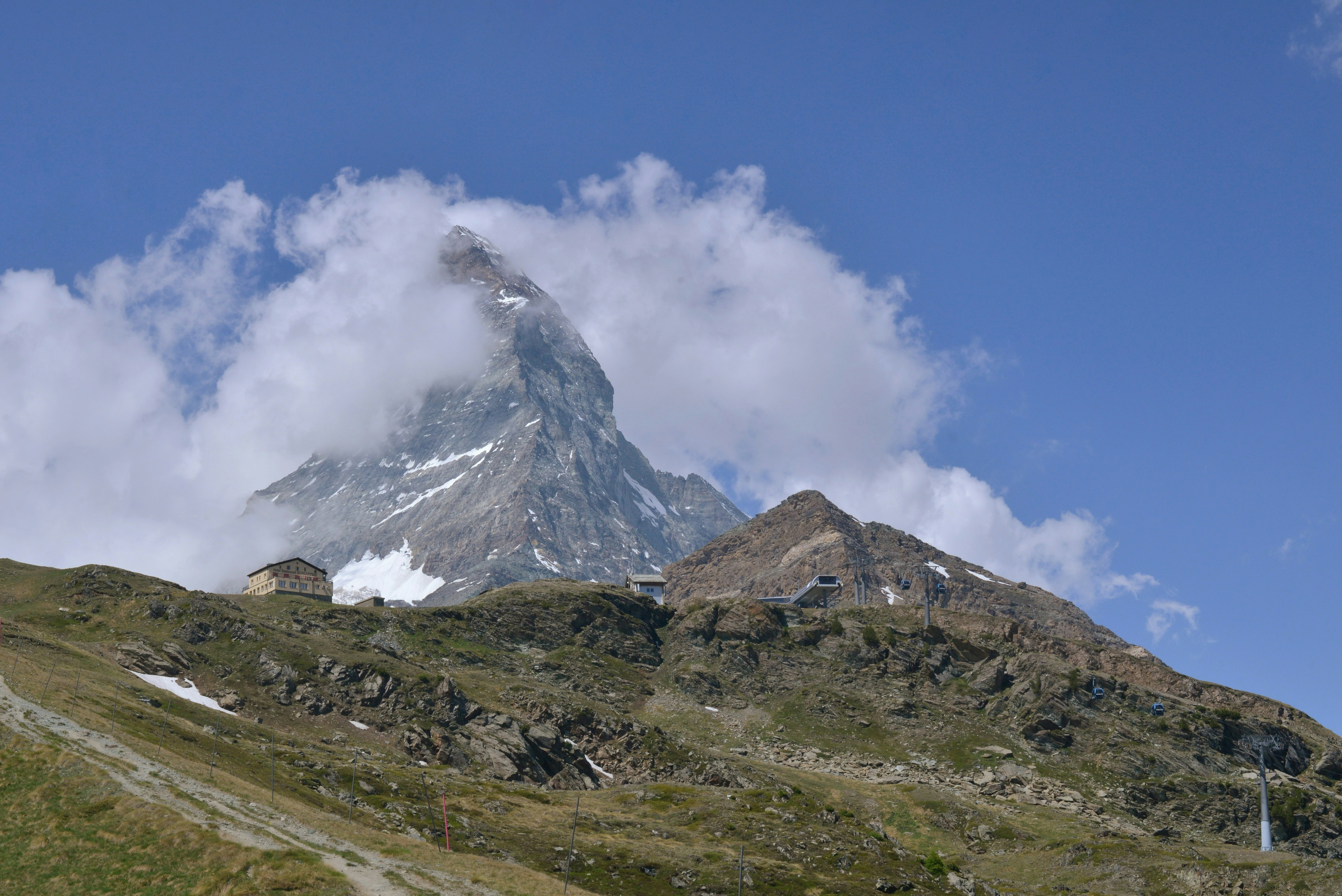 Summit Veil Over the Alpine Ridge