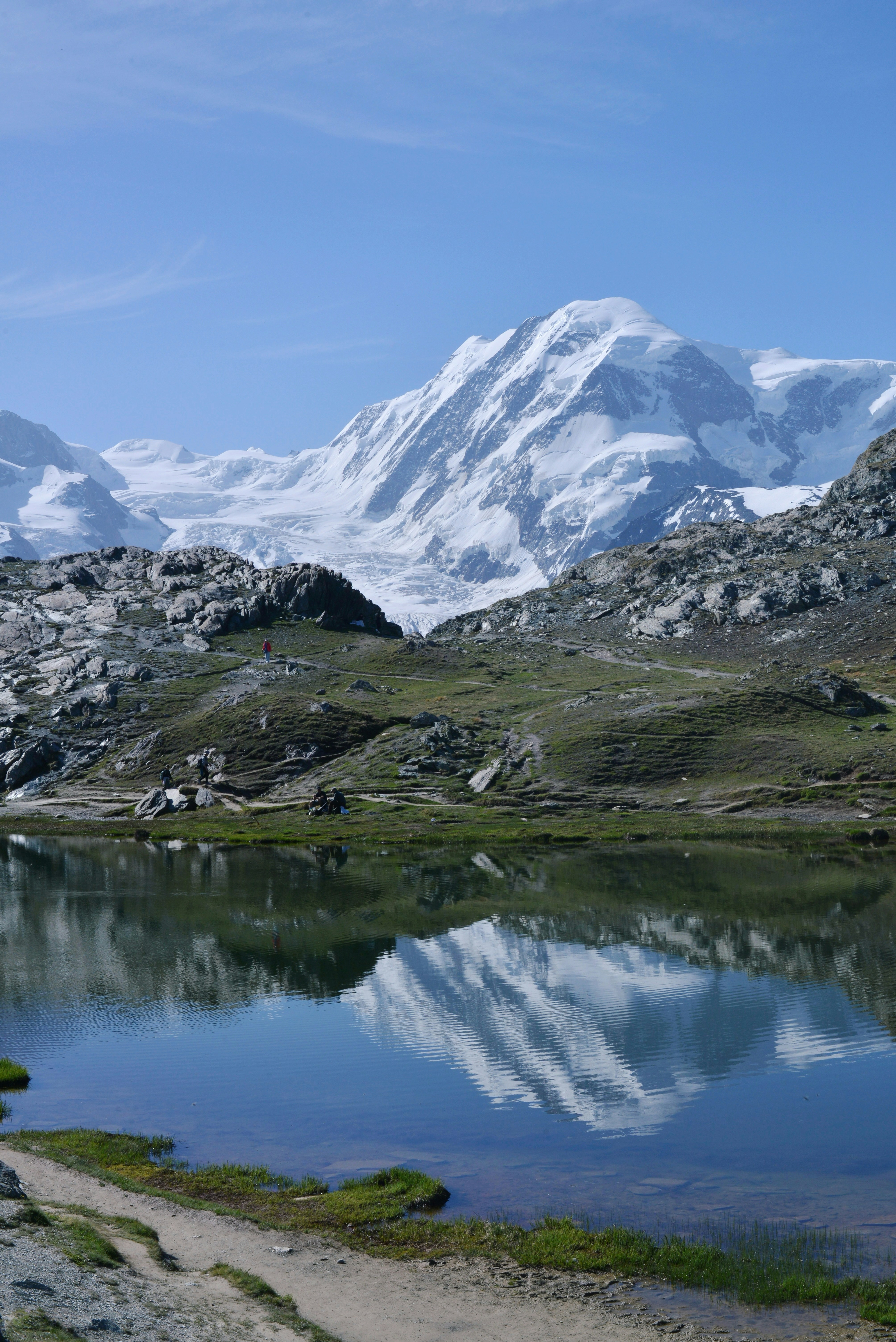 Snowy Peak Mirror: A Quiet Alpine Reflection