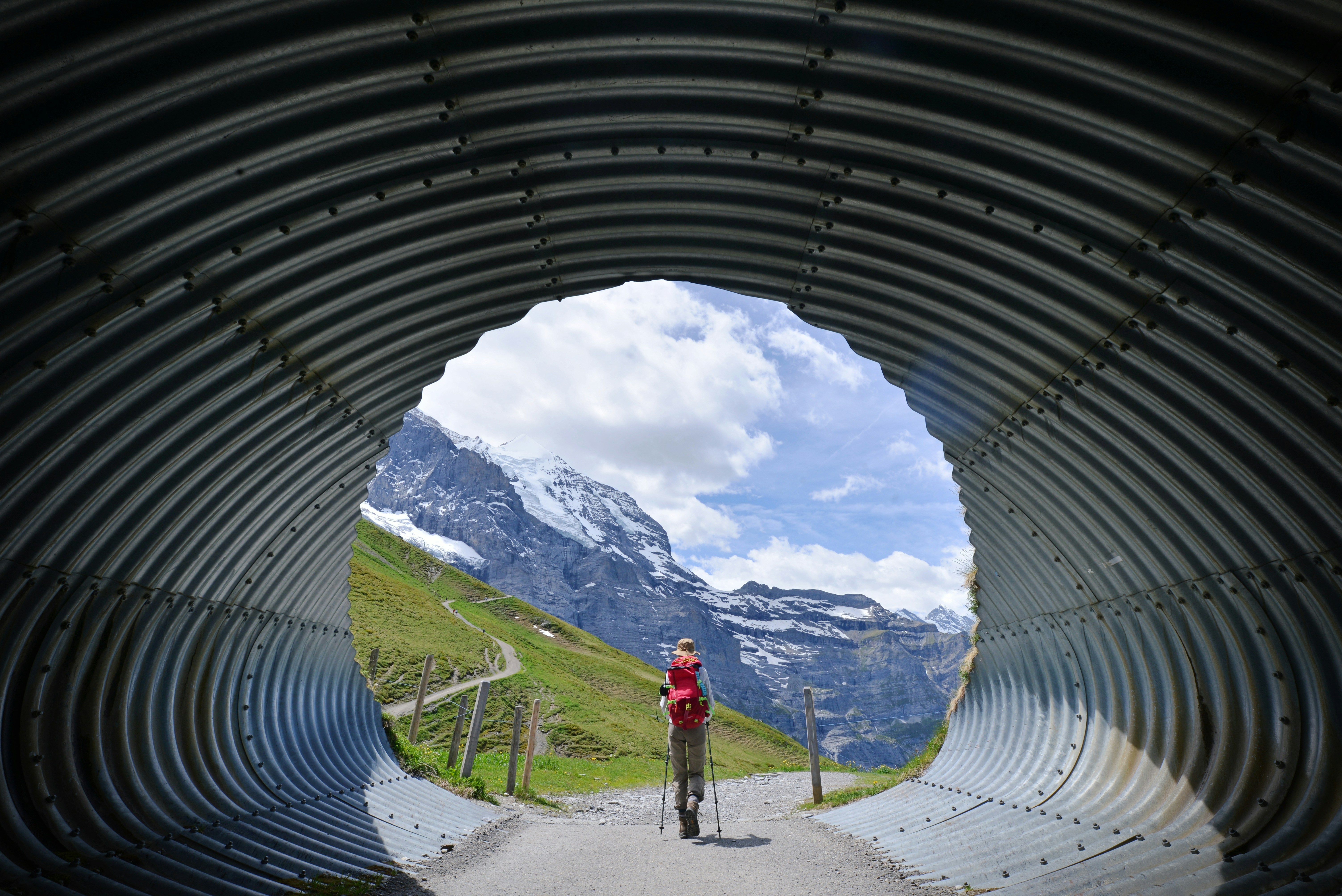 Cyclist at the Gate: A Mountain Tunnel Frame