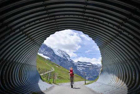 Cyclist at the Gate: A Mountain Tunnel Frame