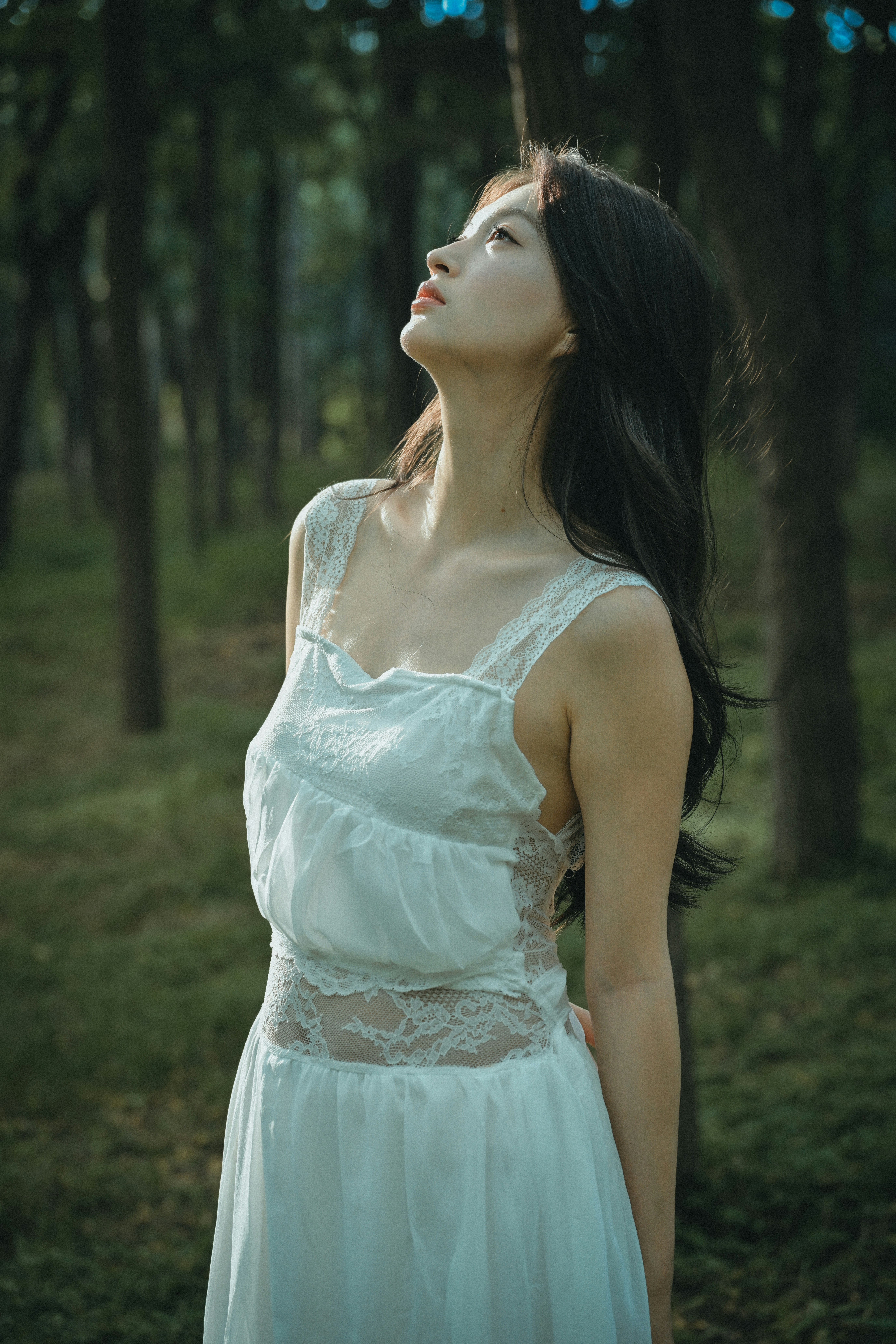 Ethereal Portrait in a Sunlit Forest Lane