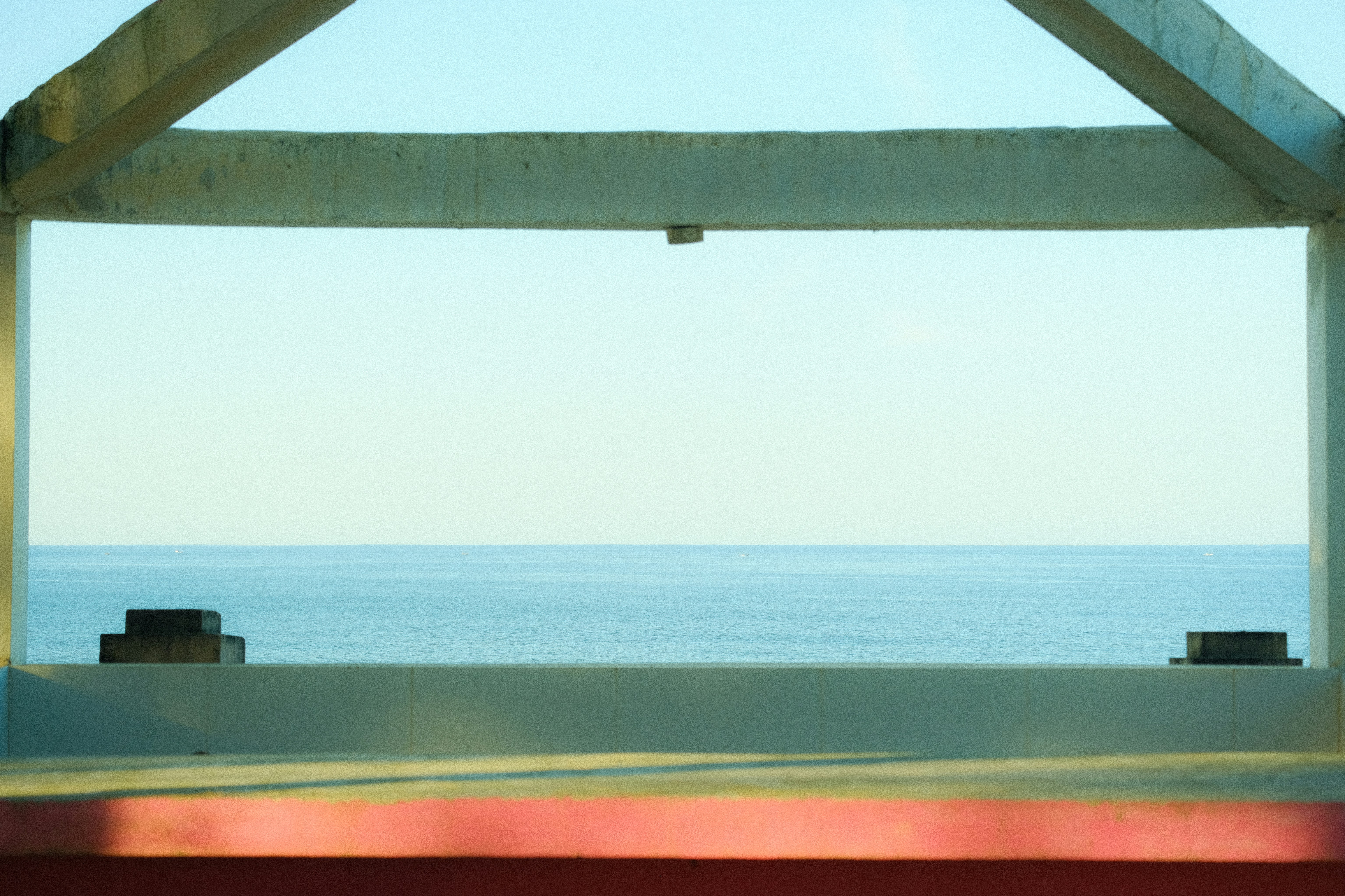 Framed Horizon: Sea View Through a Geometric Window