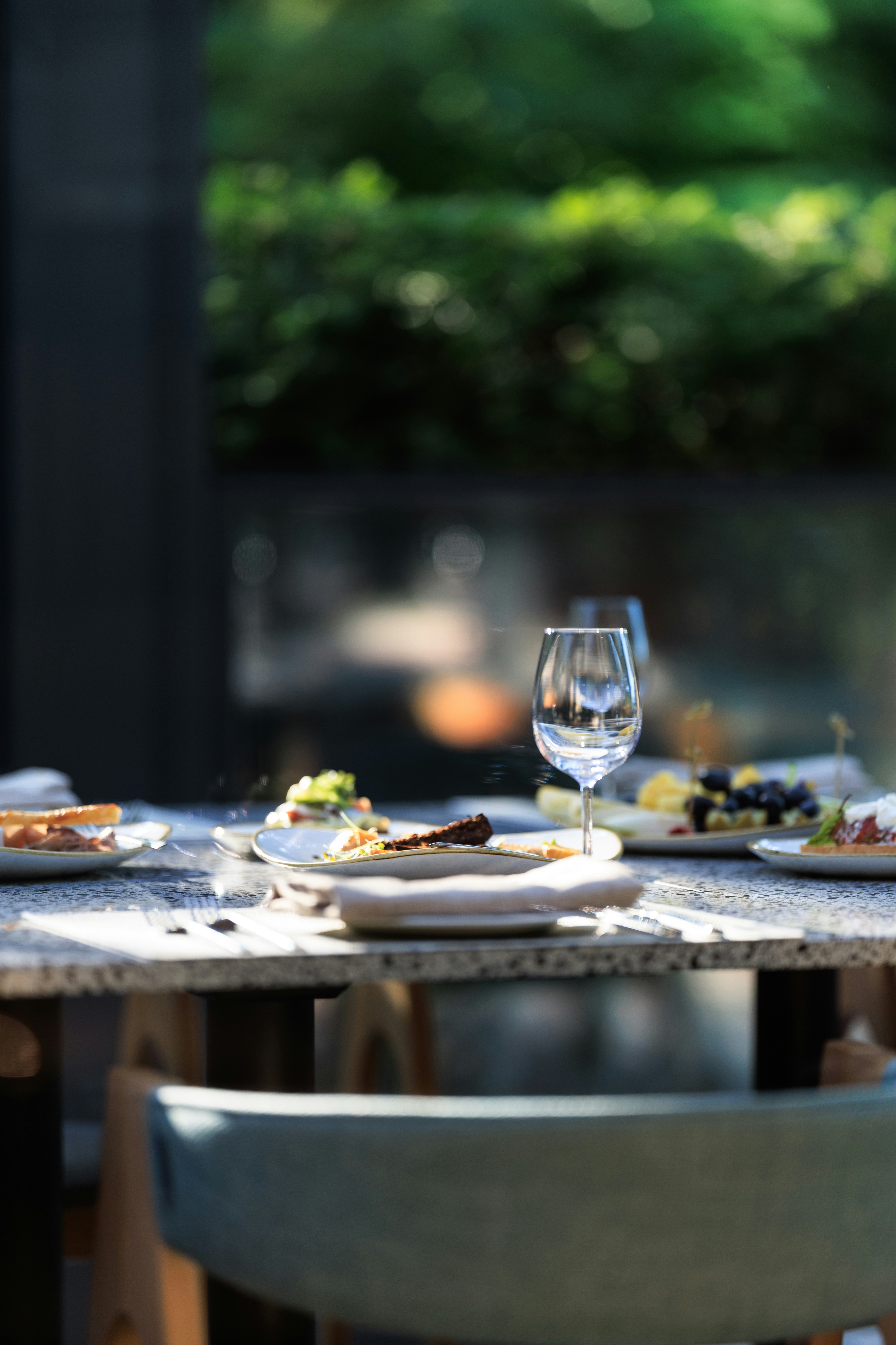 Wine Glass Centerpiece: A Quiet Moment Amid Appetizers