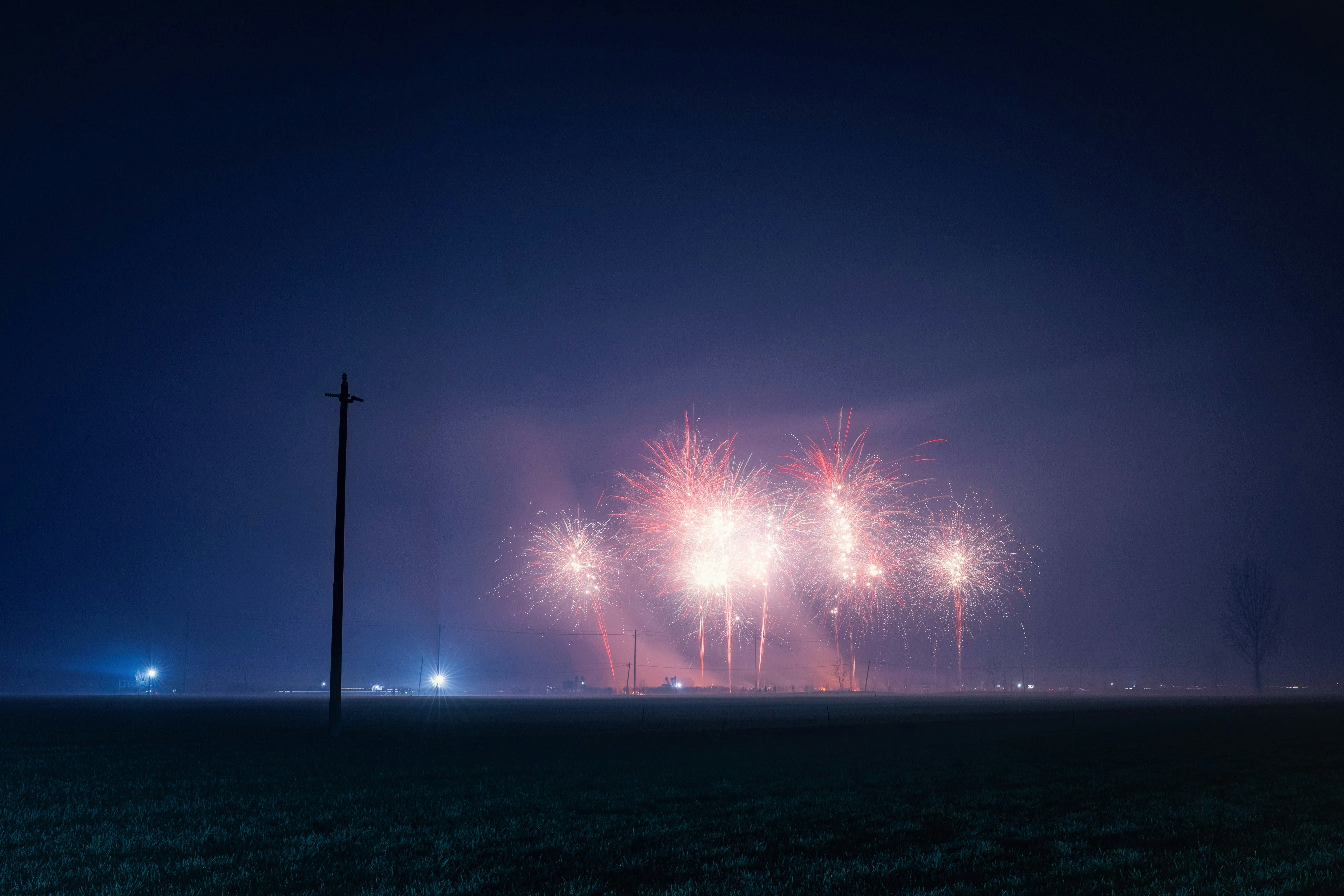 Midnight Field Ignition: Fireworks over a Quiet Horizon