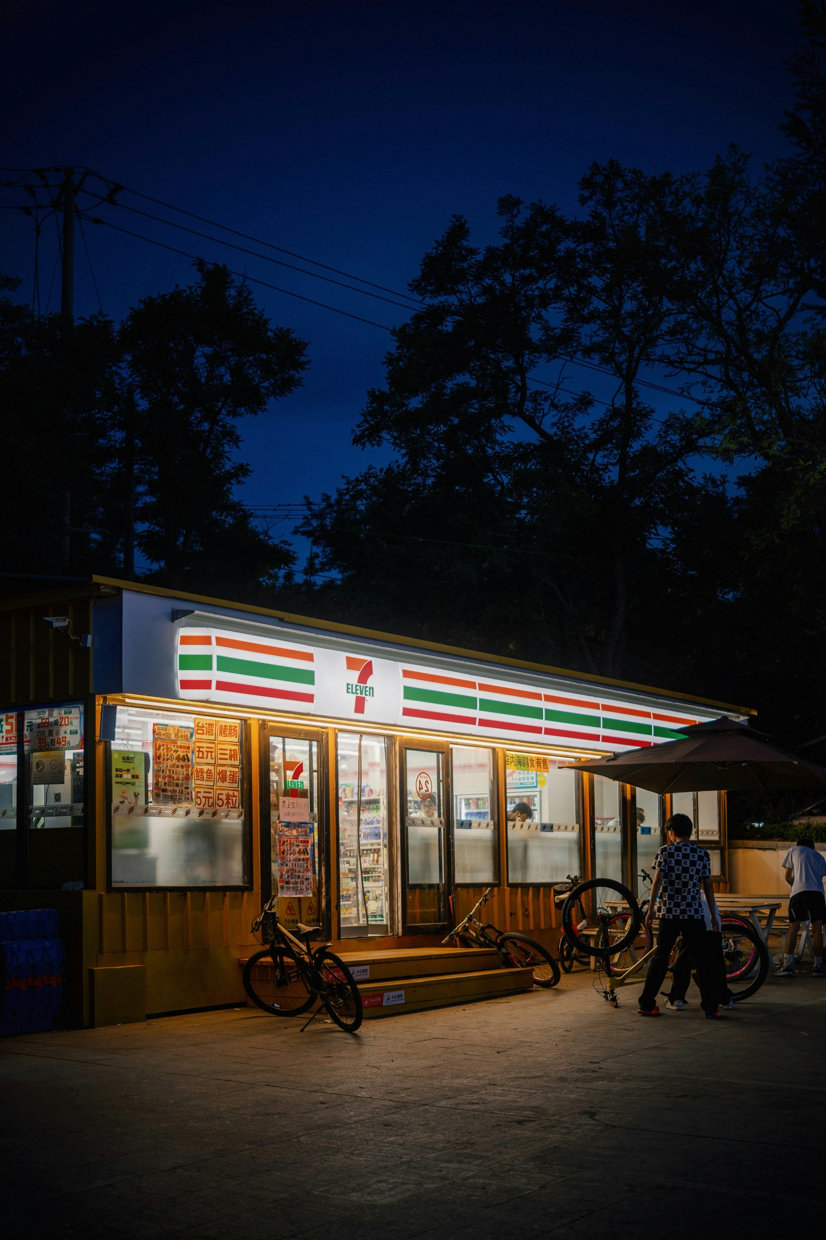 Night Light at the Corner Store: Neon Glow and Pedal Power