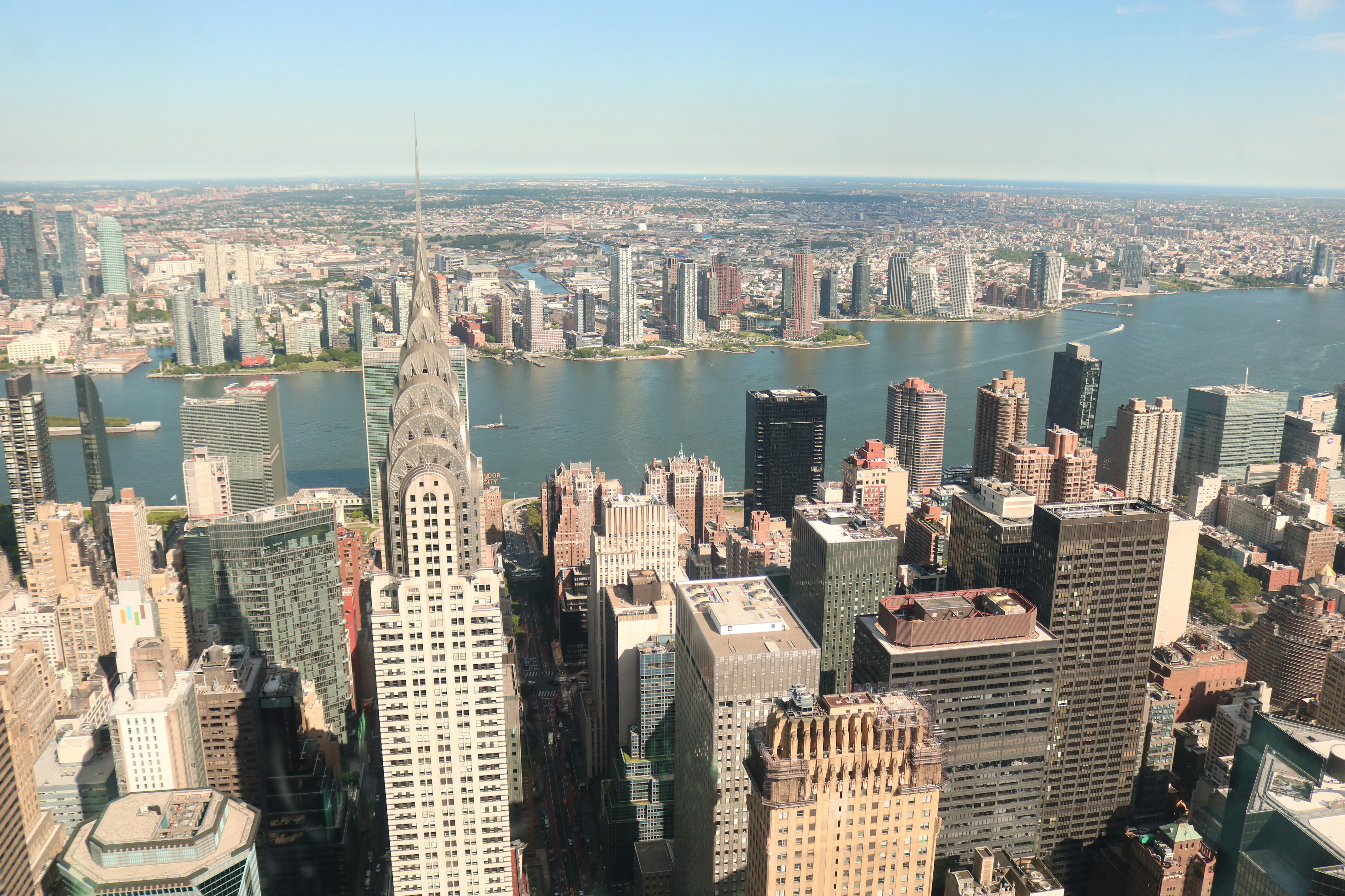 Mosaic of a Skyline: Sunlit Towers Over a Broad Hudson Harbor