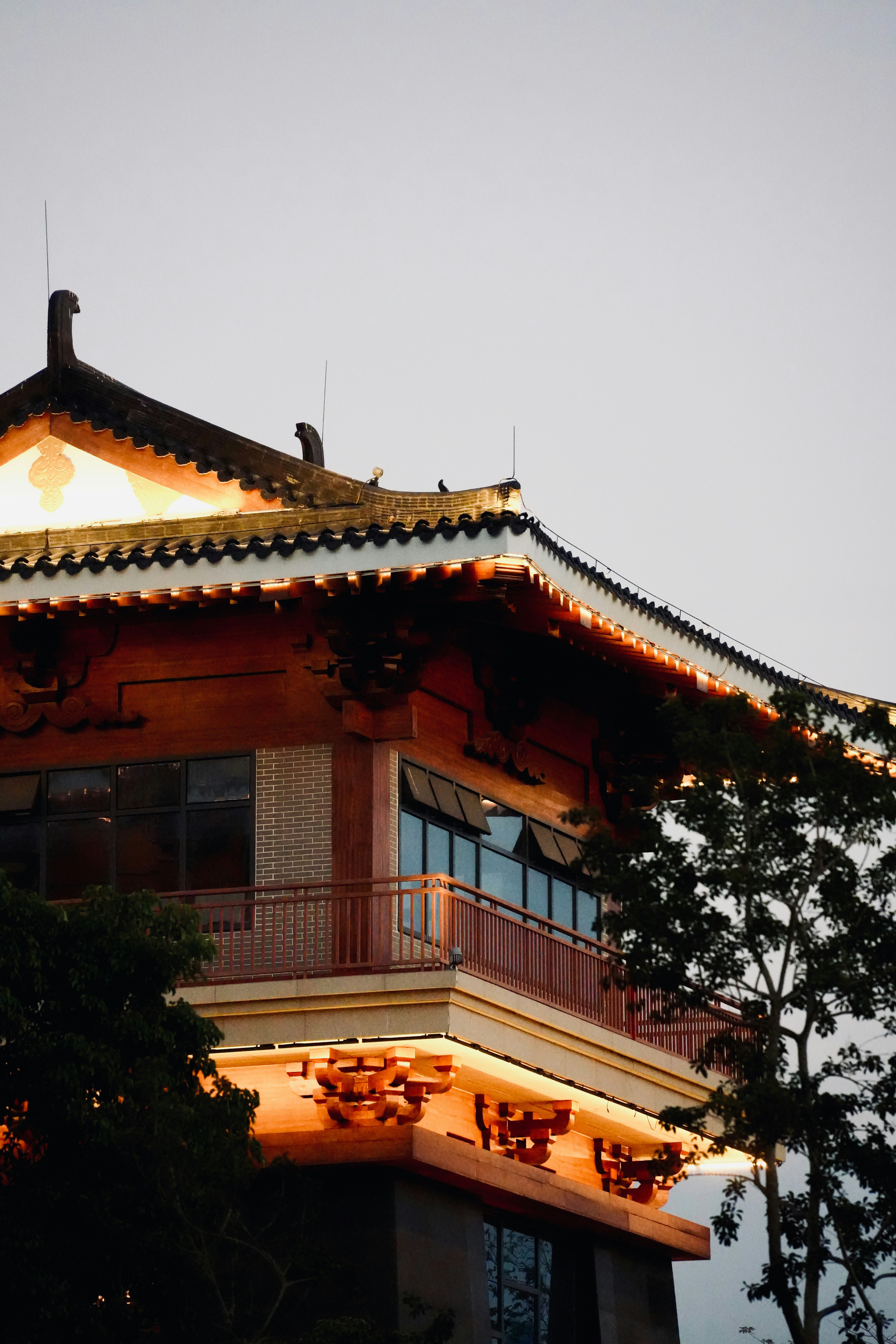 Pagoda-Style Corner: Warm Lights Embrace the Traditional Roofline
