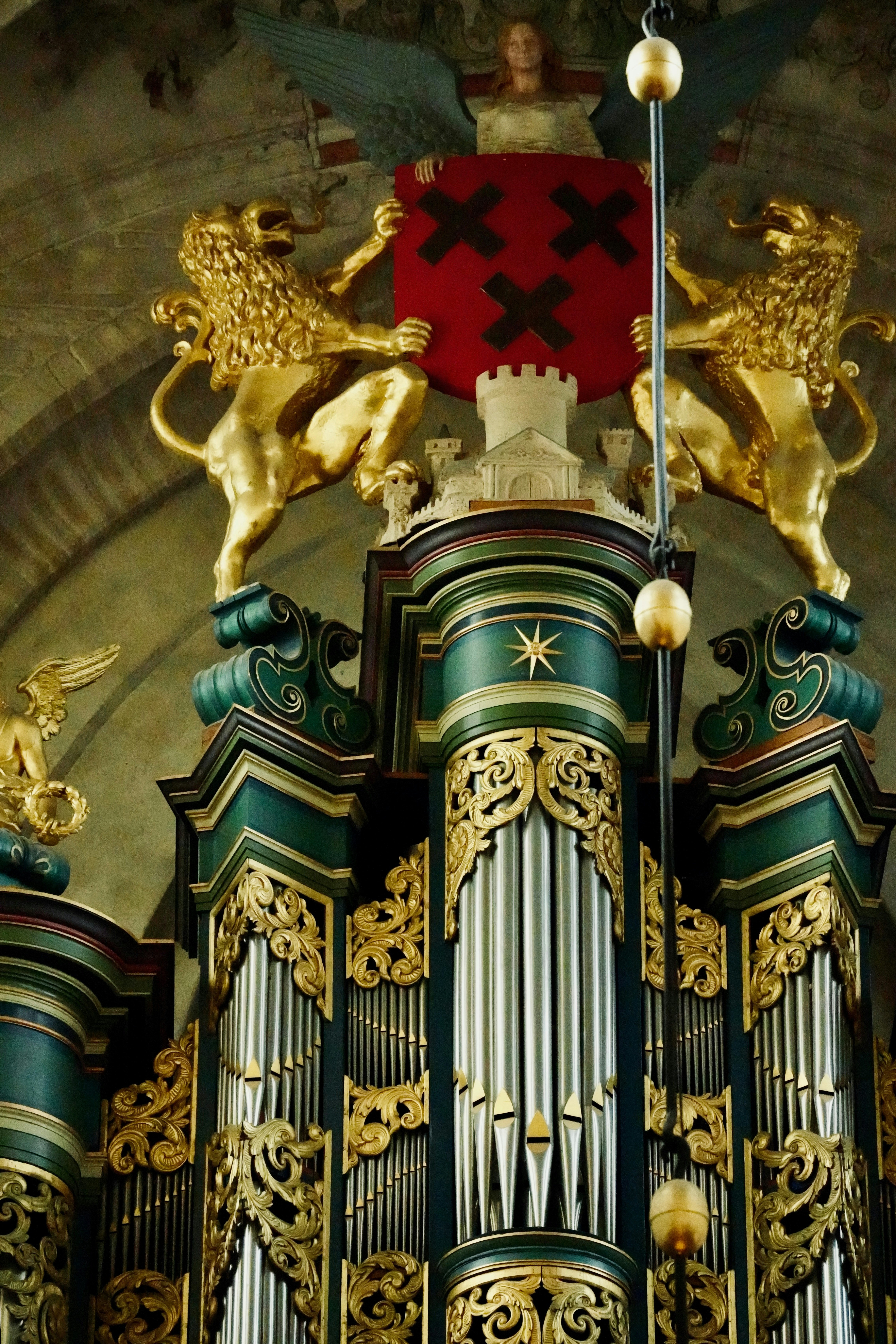 Golden Choir: A Baroque Organ Surrounded by Lions
