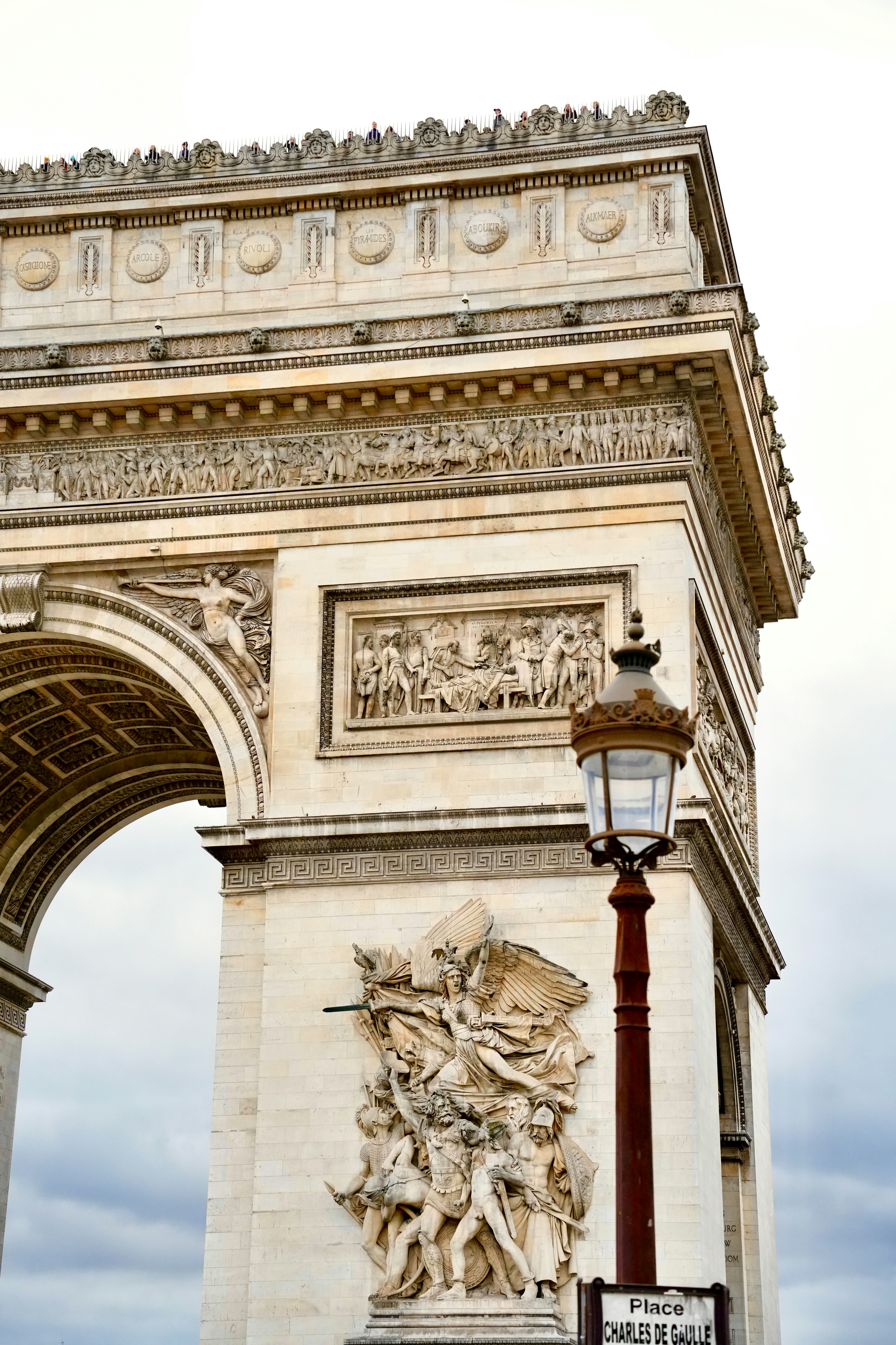 Stone Carvings and Lantern: The Arc’s Quiet Majesty