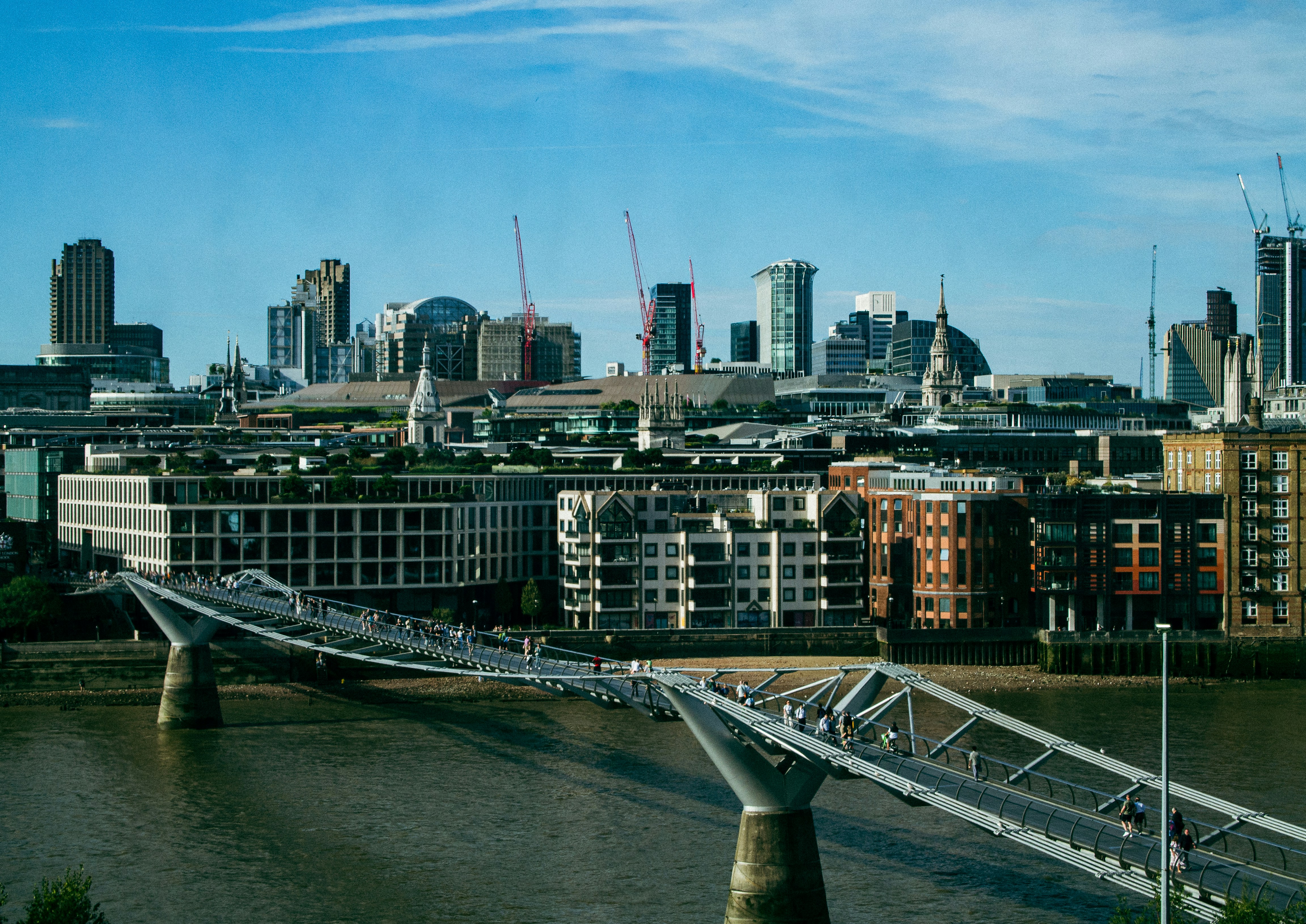 Riverfront Arc: The City’s Steel Ballet Over the Thames-like Water
