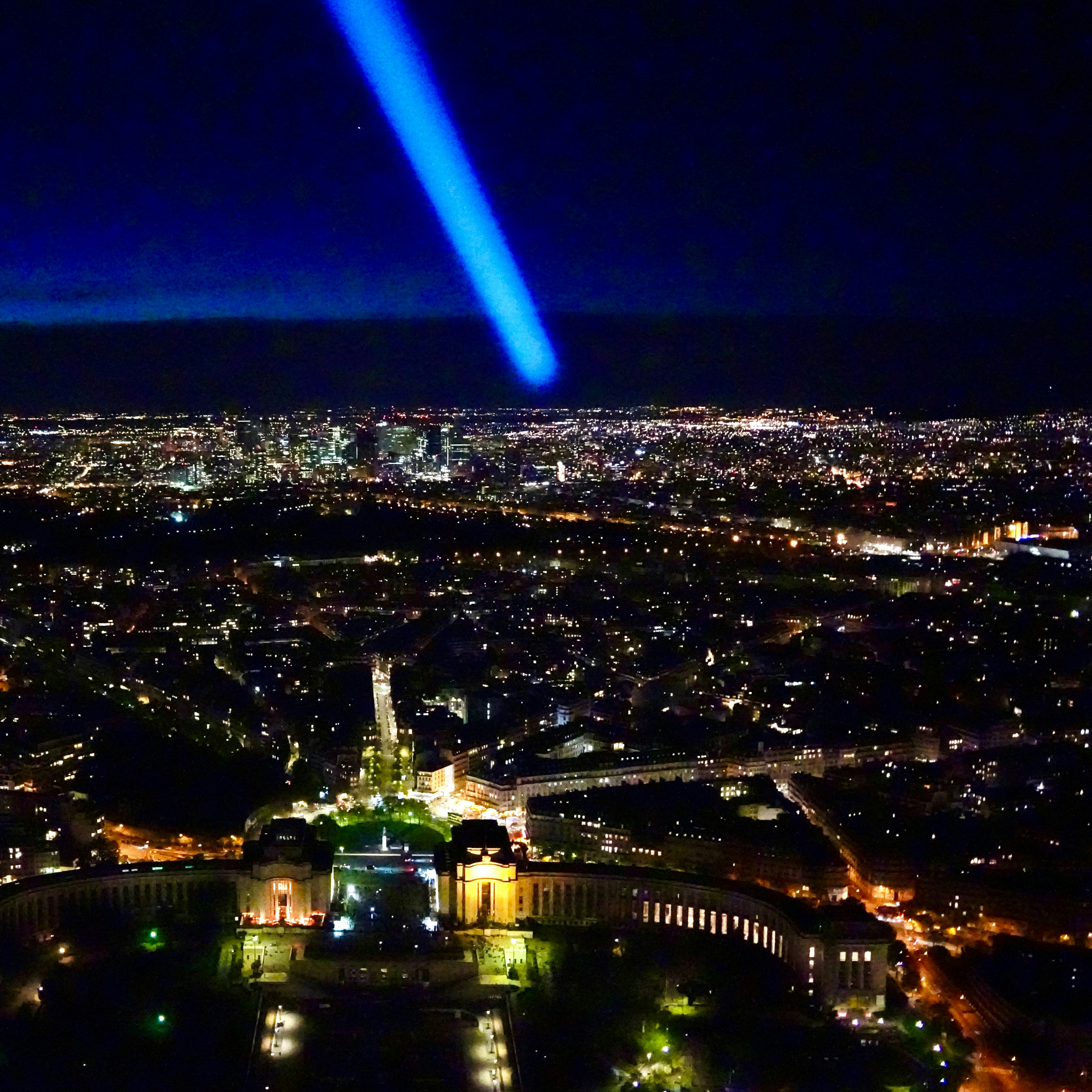 Midnight Beacon: A City Shaped by a Luminous Beam