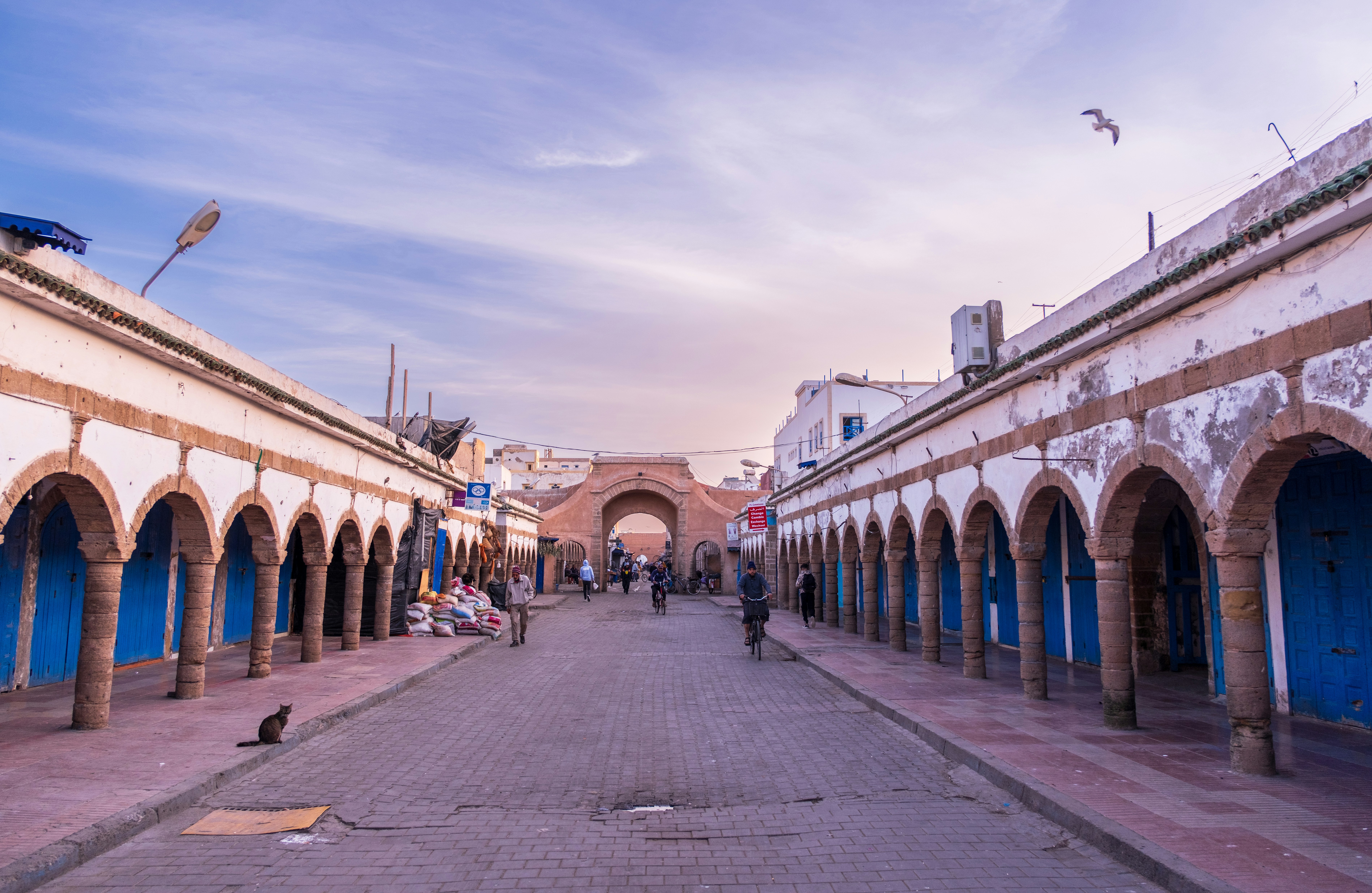 Archway Street: Symmetrical Market Arcades Leading to a Distant Square