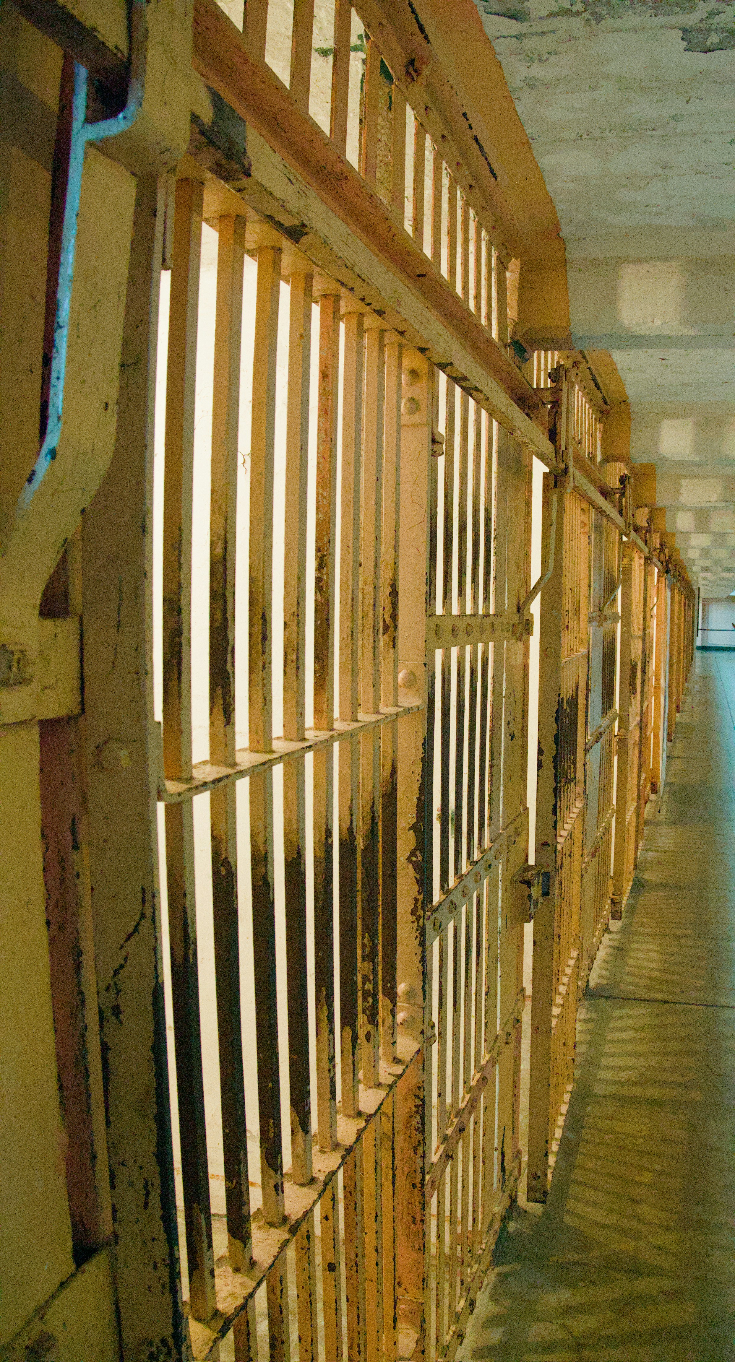 Caged Corridor: Repeated Lines and Weathered Iron