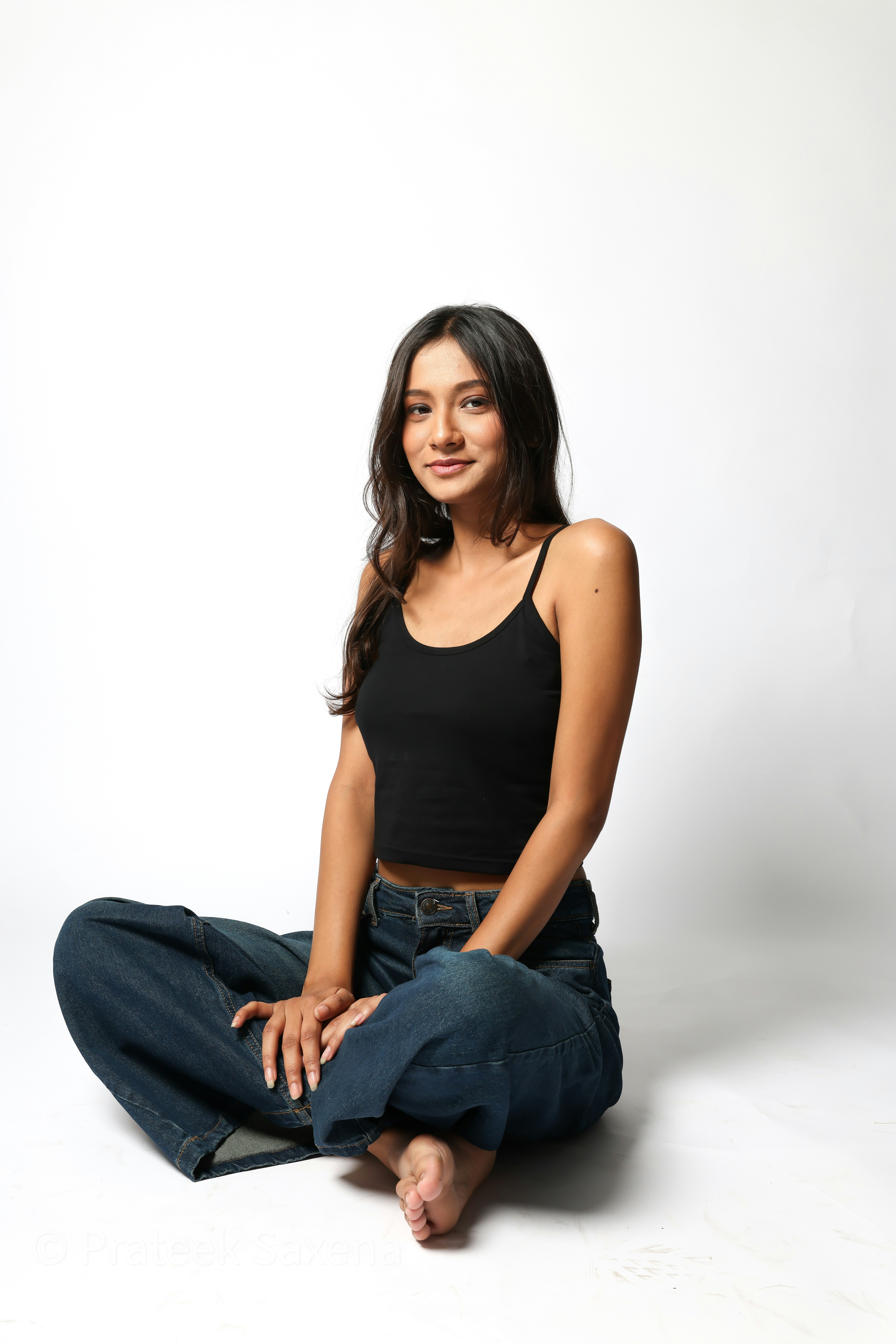 Centered Calm: A Seated Portrait in Soft Studio Light