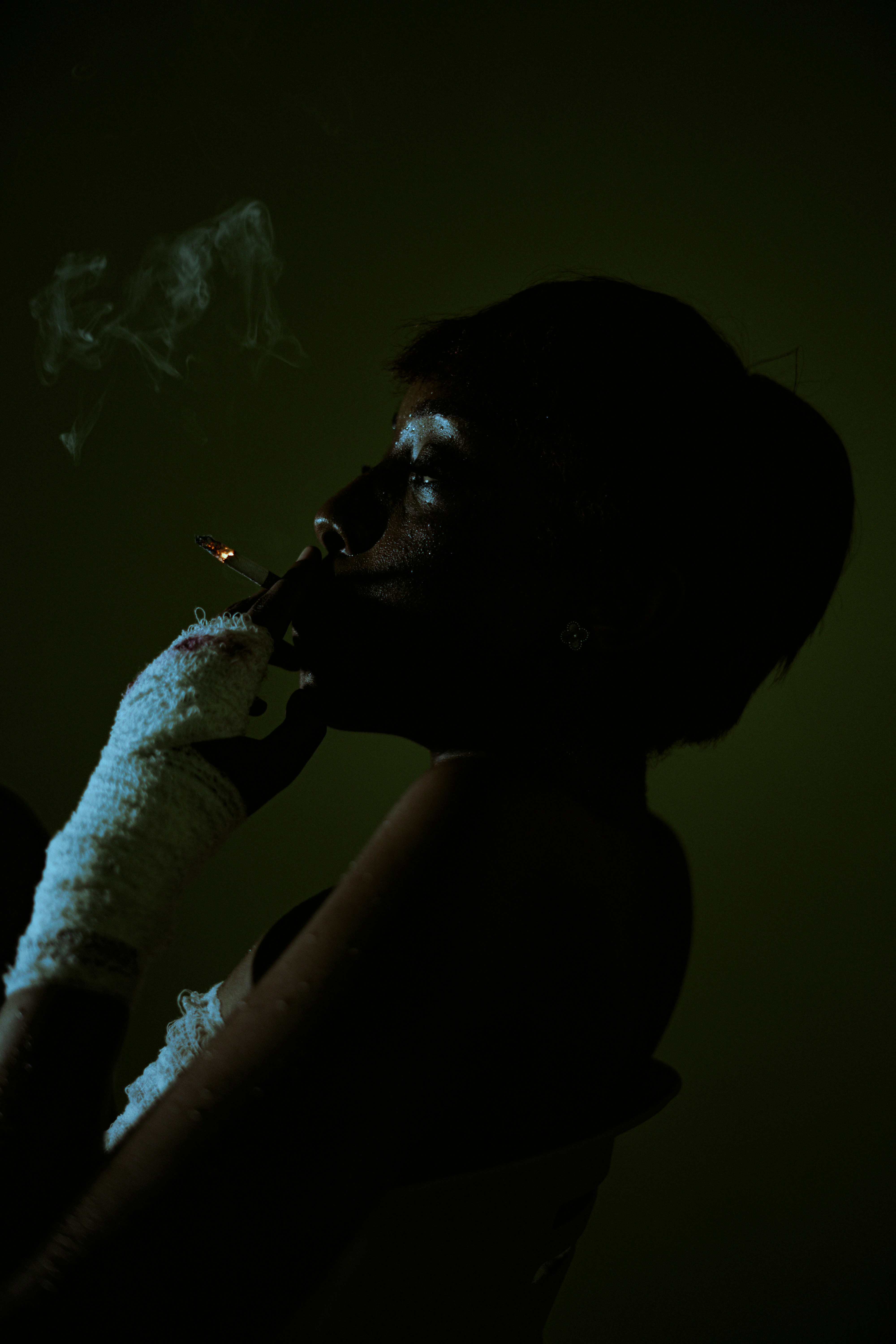 Shadowed Breath: A Portrait in Quiet Contemplation