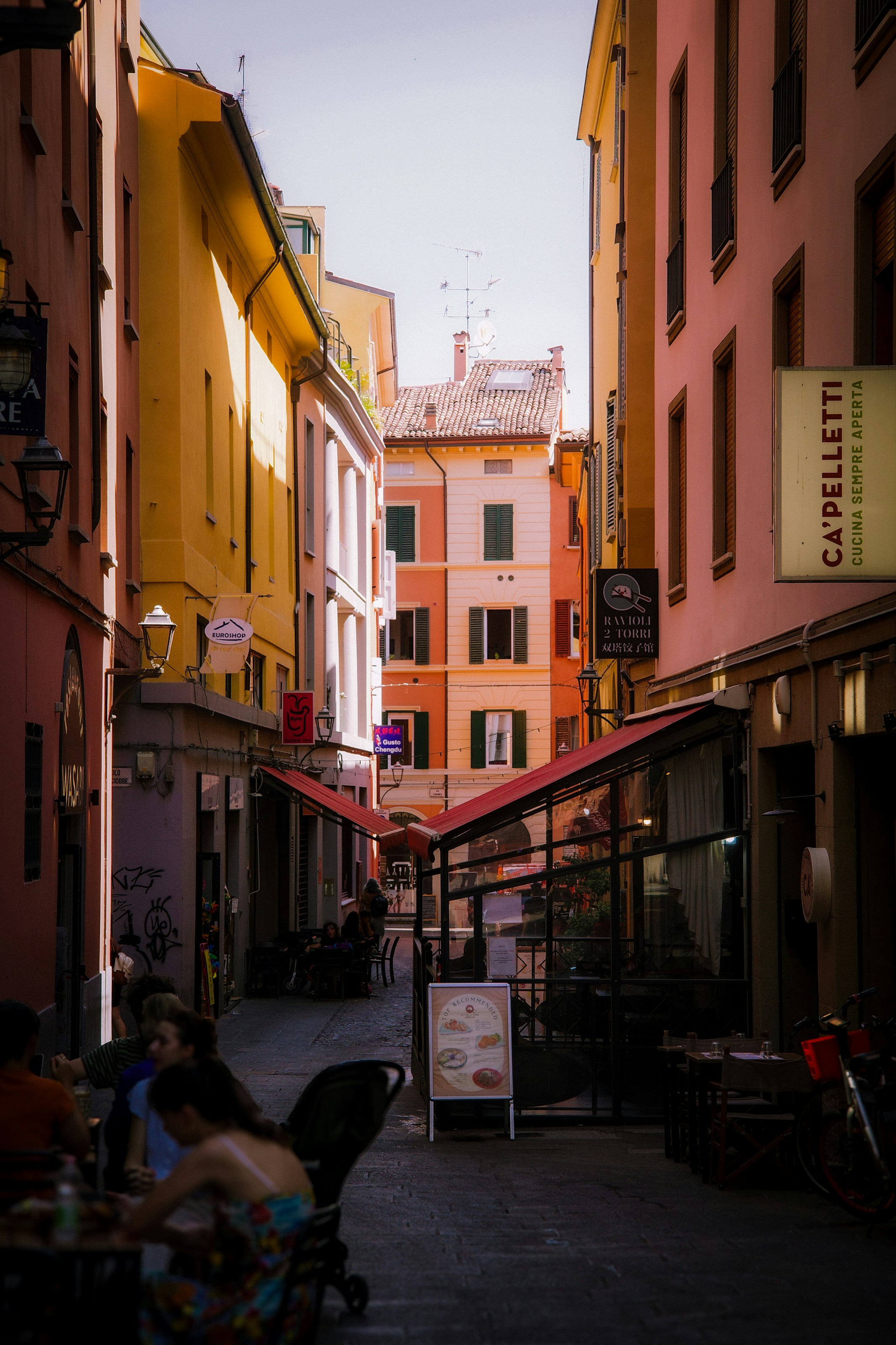 Sunlit Alley Café: A Sliver of Piazza in Warm Italian Light