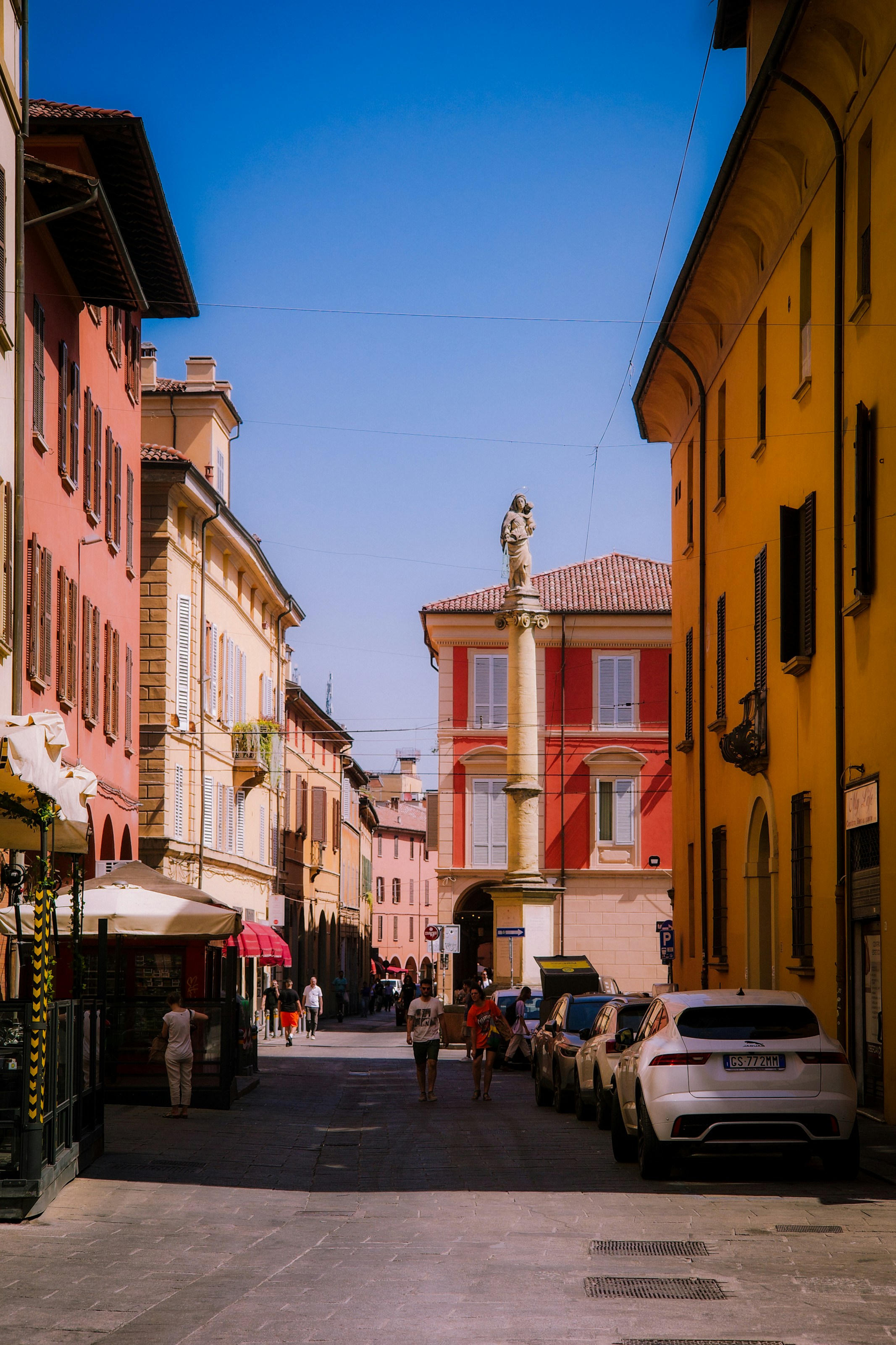 Colorful Mediterranean Street Arrives at a Quiet Plaza