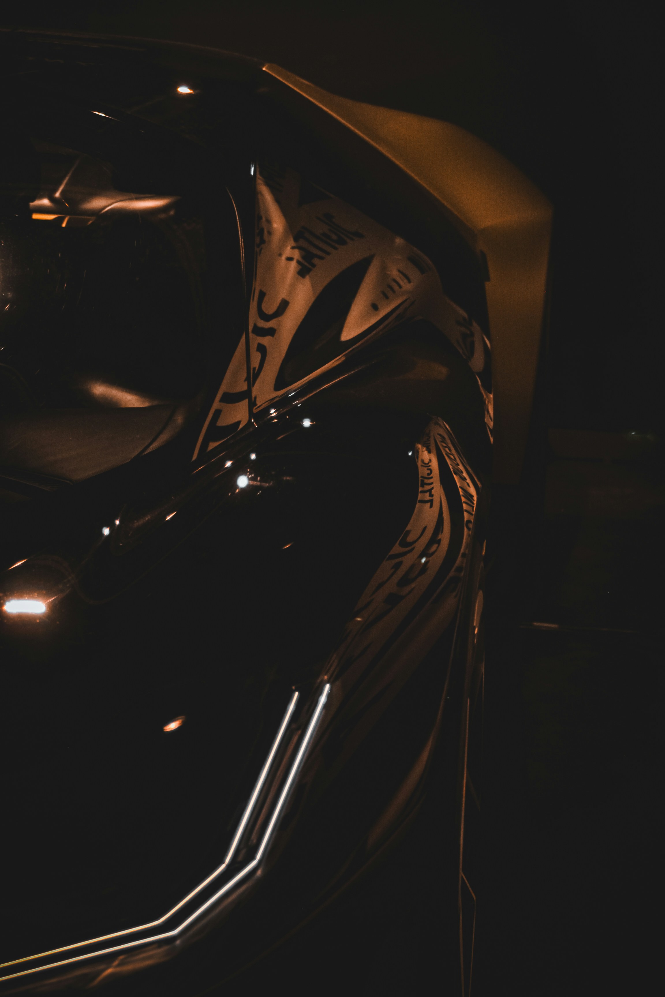Low-Light Curves: The Faceted Glint of a Midnight Coupe