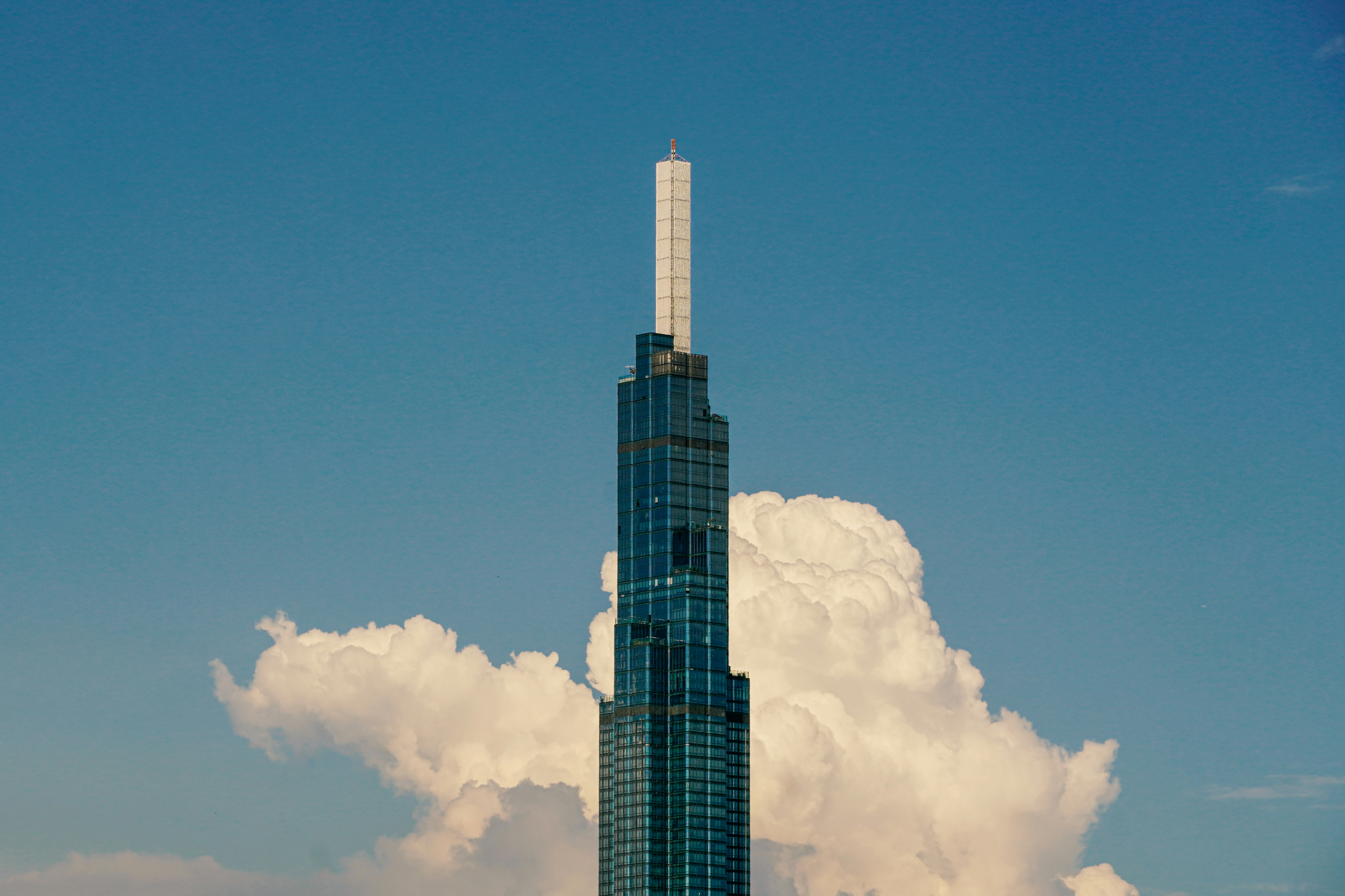 Tapered Tower Rising Above a Cloudline