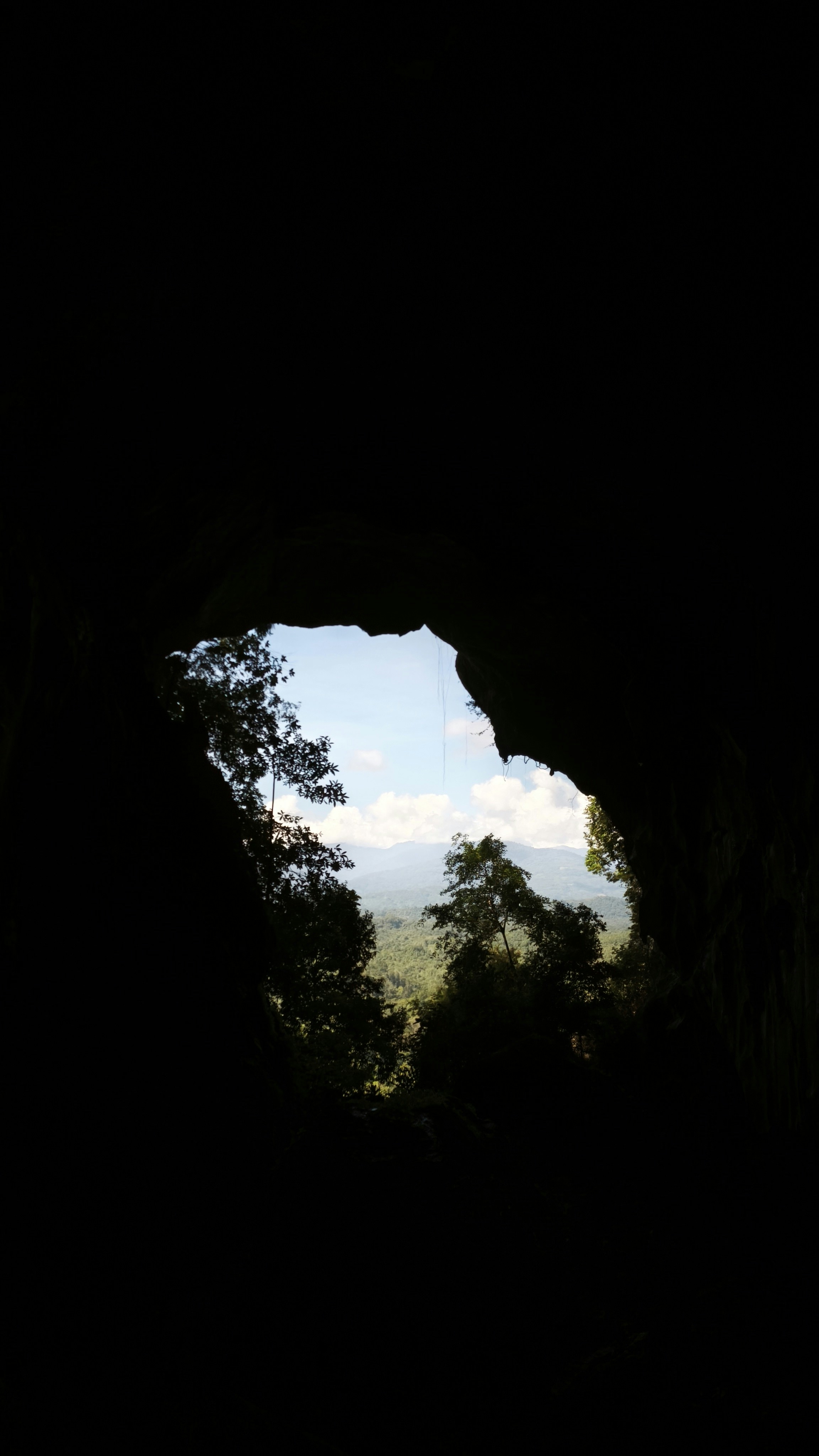 Opening to the World: Light Framed View from a Dark Cave