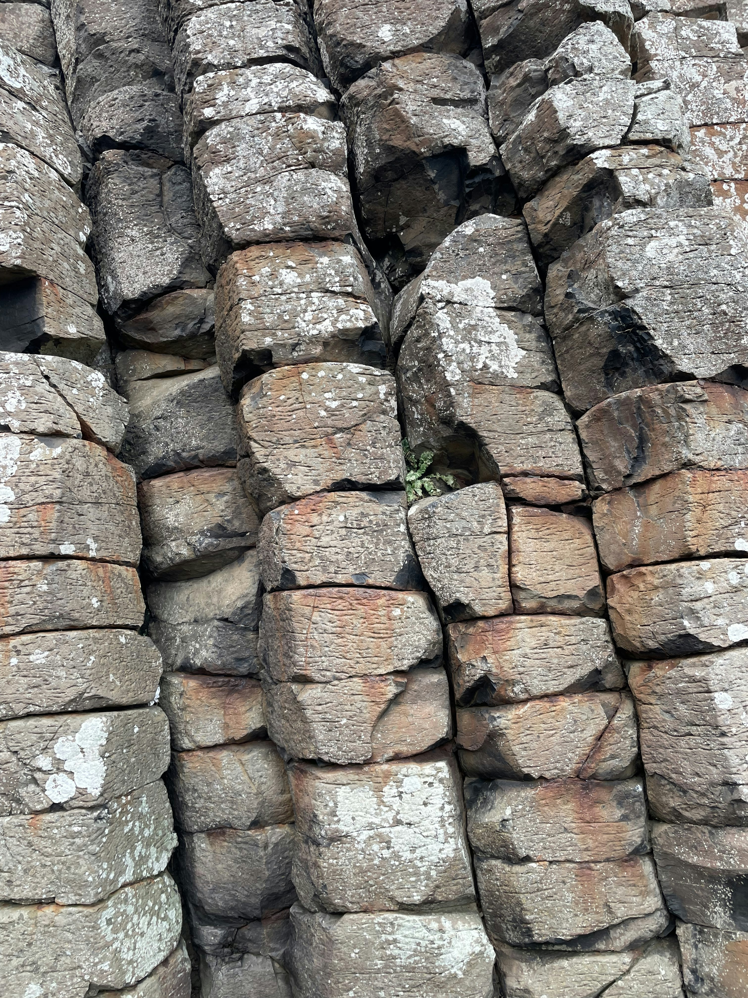 Stone Logs: Weathered Stack Revealing Timeworn Edges