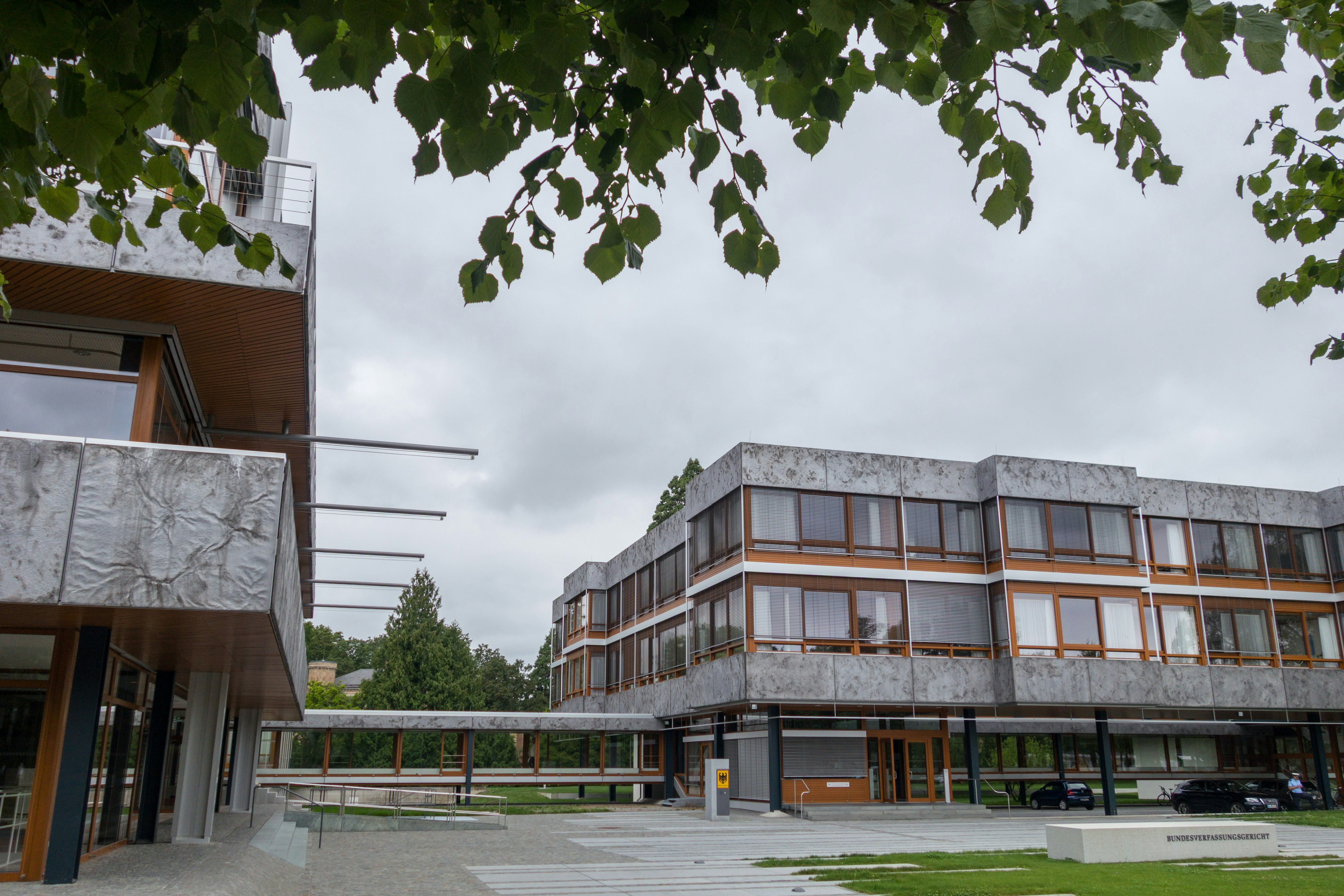 Modernist Campus Courtyard Under Framed Canopy