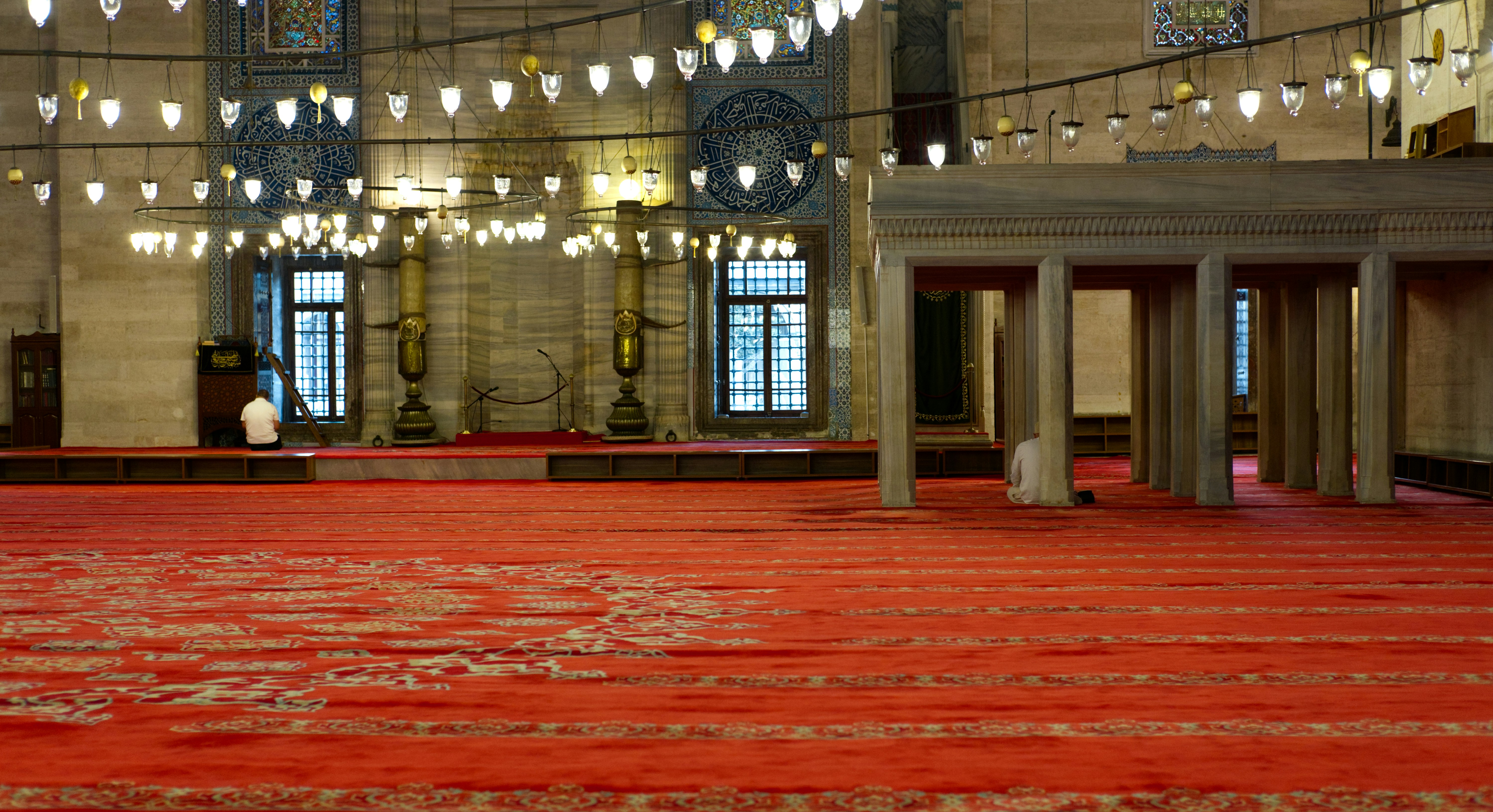 Scarlet Carpeting and Lanterned Hallways