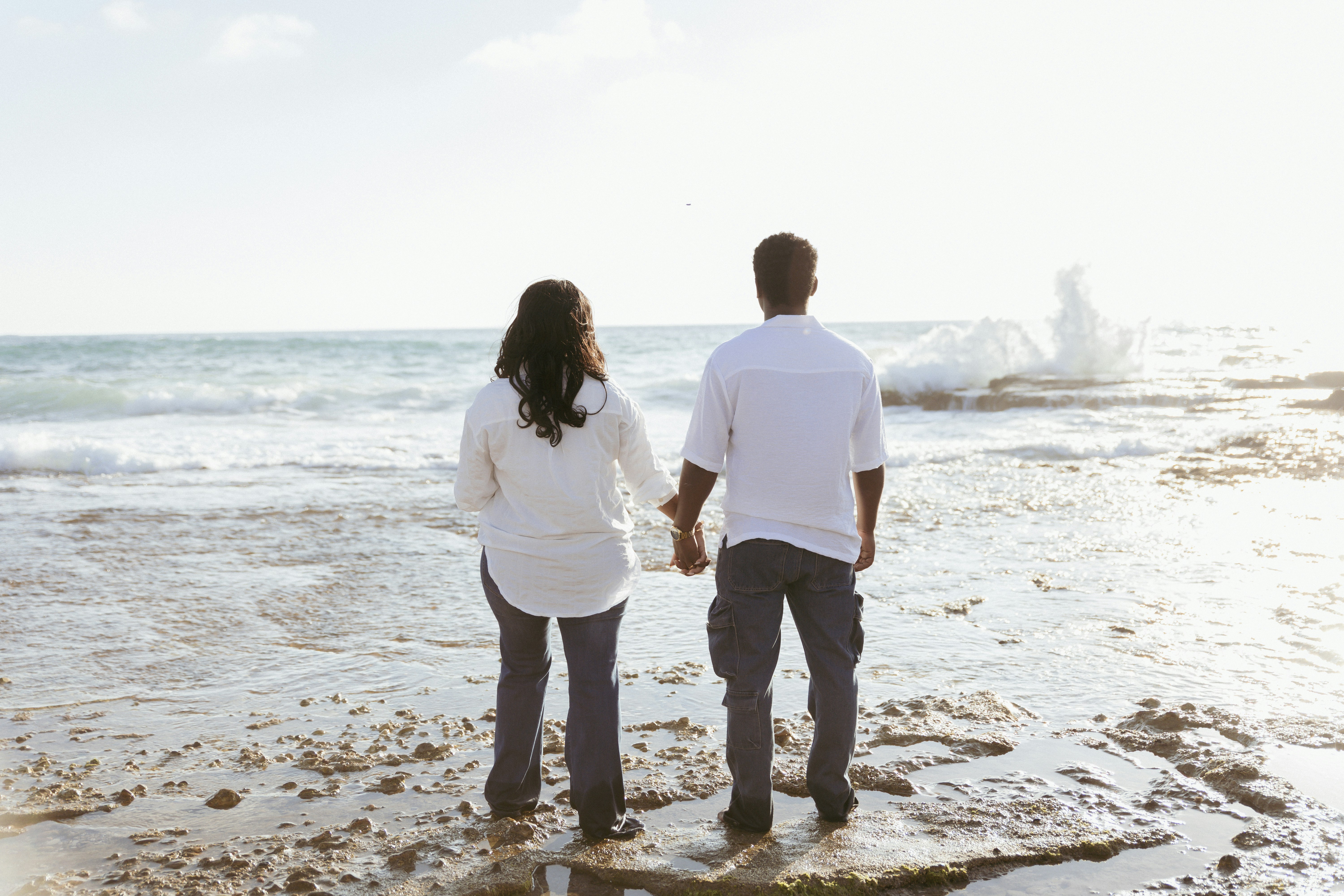 Holding the Tide: Two in White by the Sea