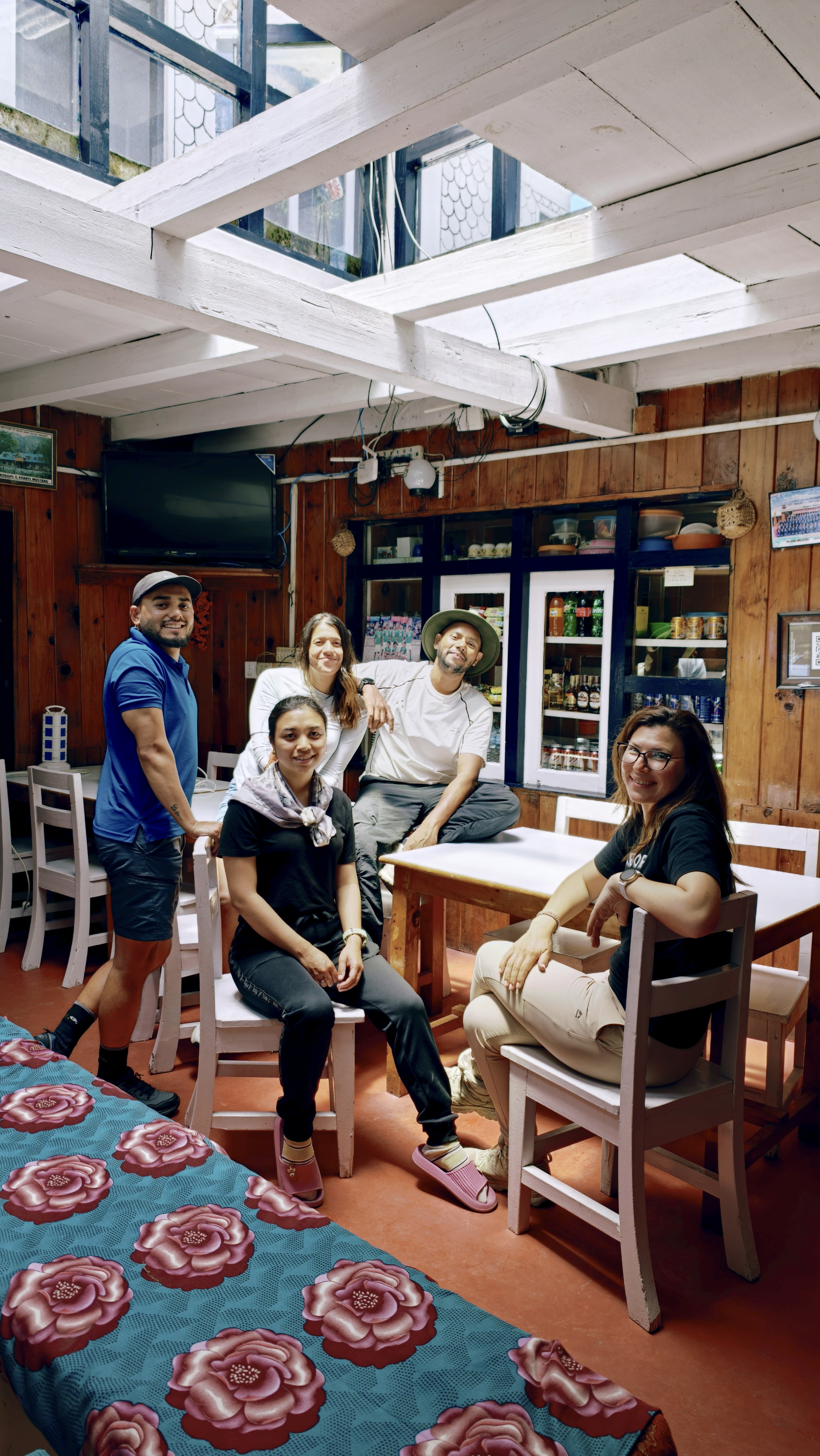 Friends in a sunny, cozy cafe: a relaxed group portrait