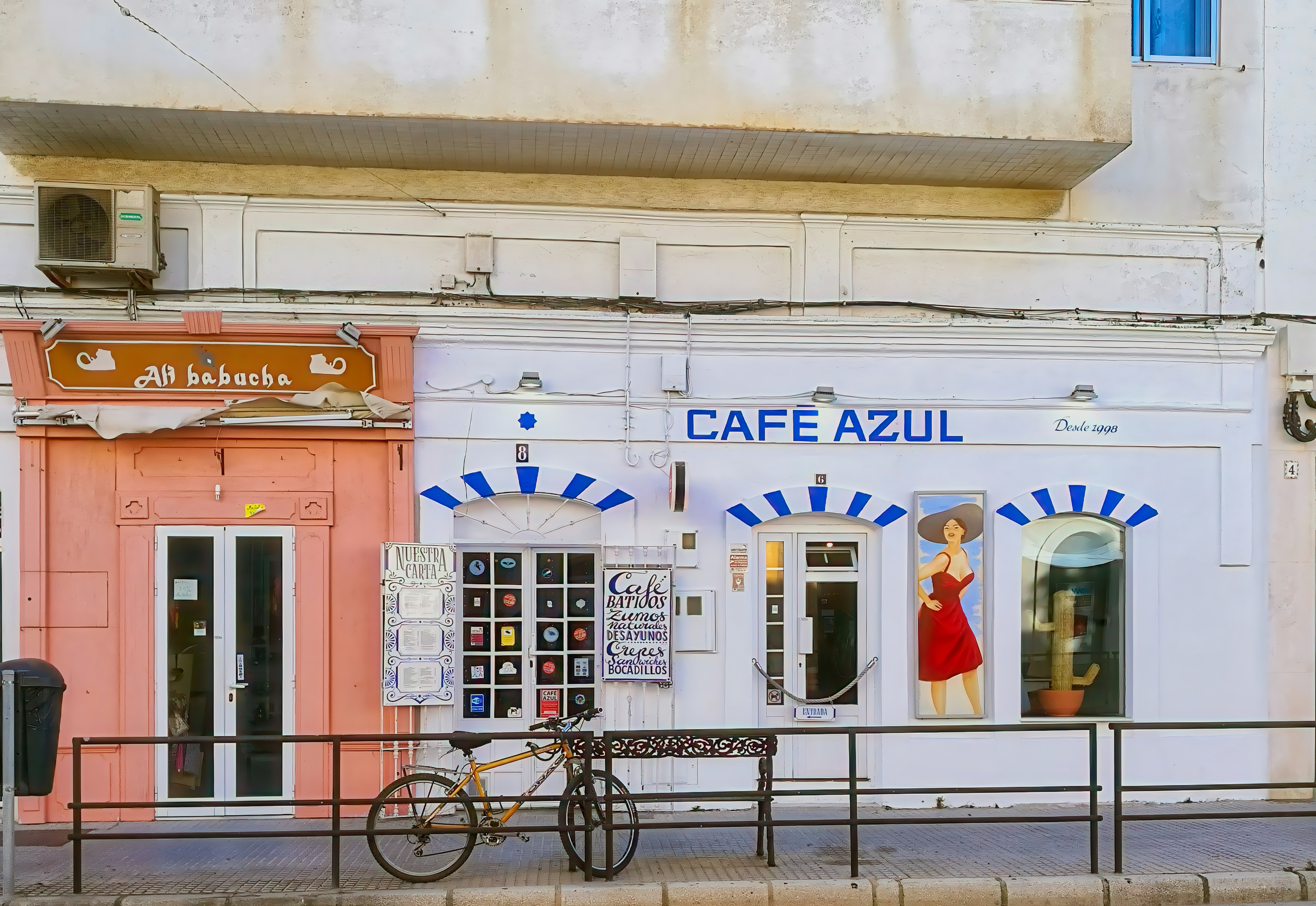 Café Azul: Pastel Facades, Bicycle Rests, and Sunlit Windows